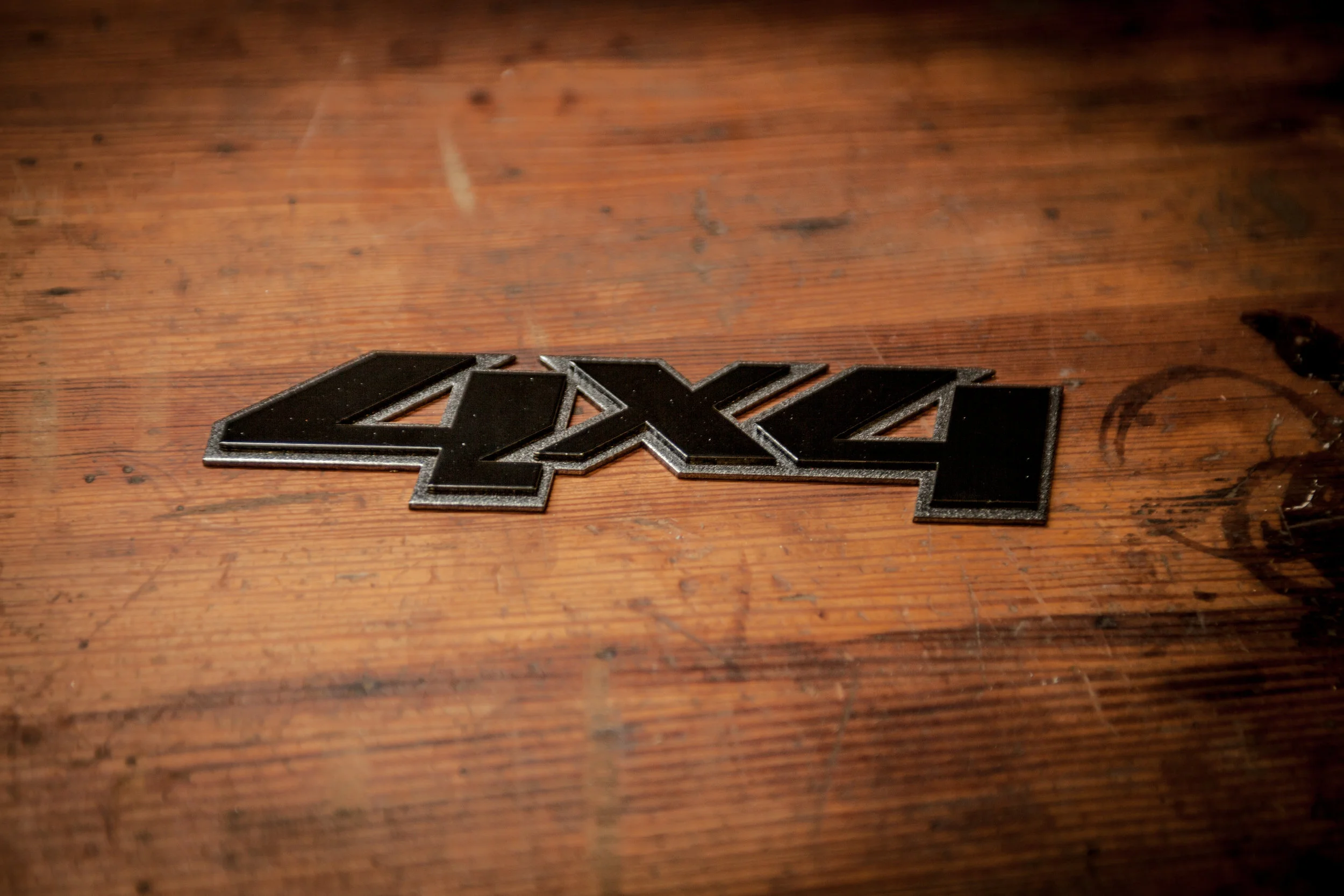 4x4 Stainless Badge — Kempter Kustoms