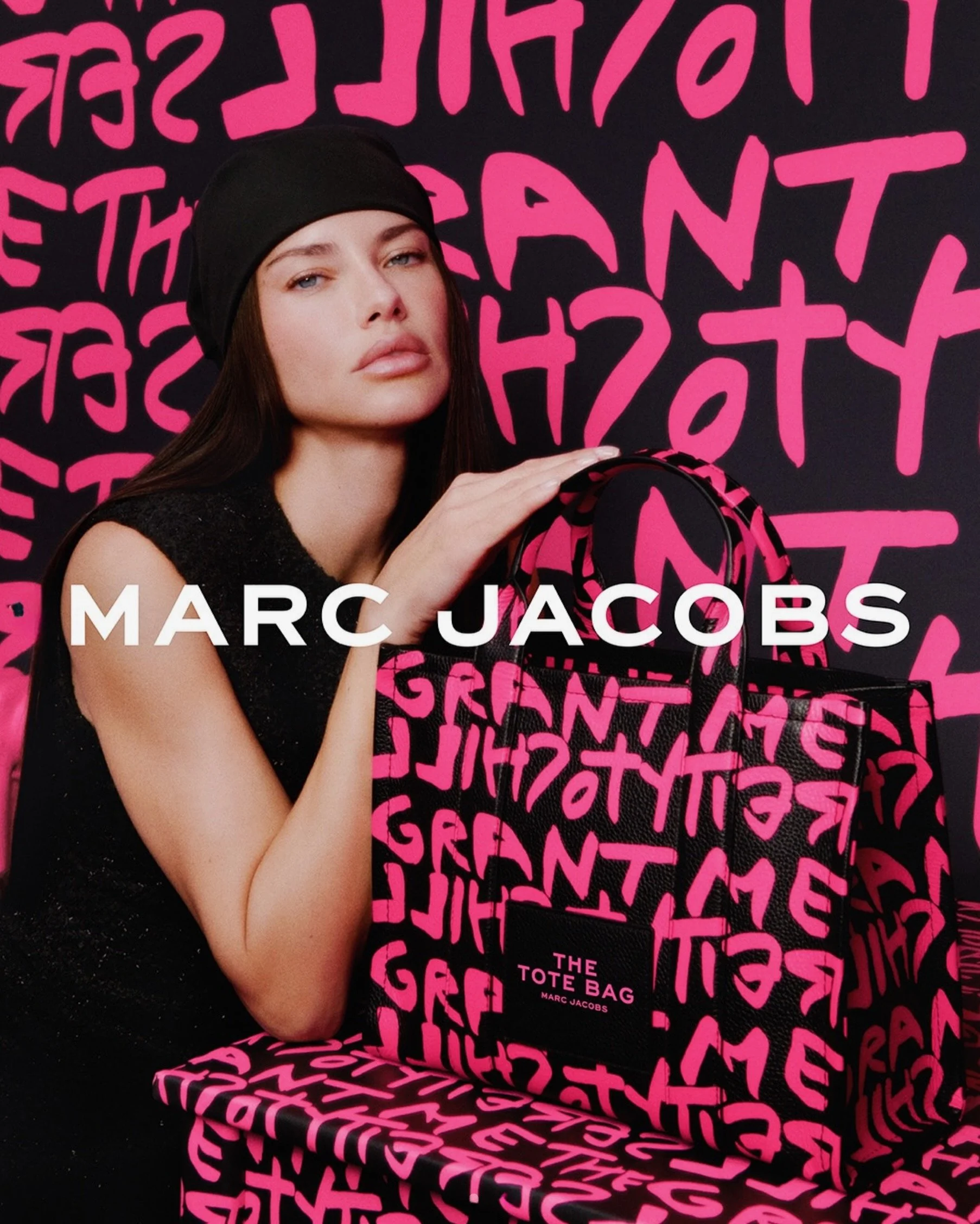 Adriana Lima Grabs Her Rebel-Loving Stephen Sprouse X Marc Jacobs Tote ...
