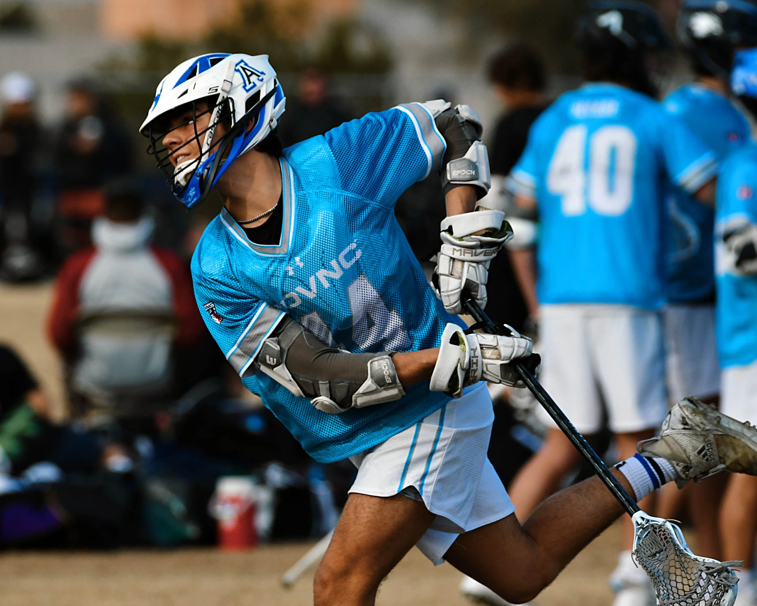 Lacrosse Players Shooting