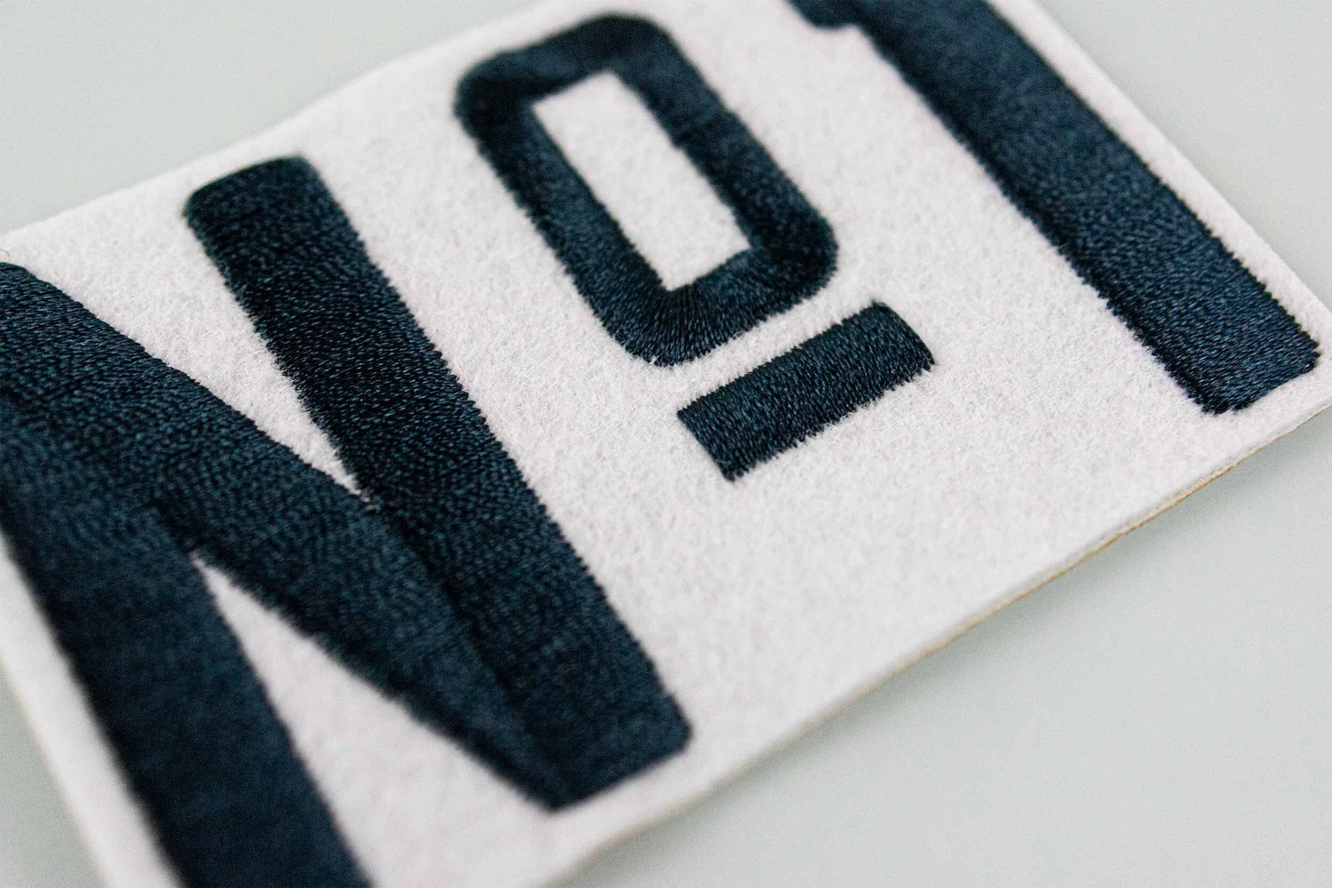Custom denim and waistband badges in leather, jacron and suede for ...