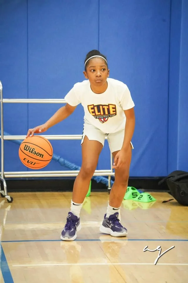 Little Girl Playing Basketball