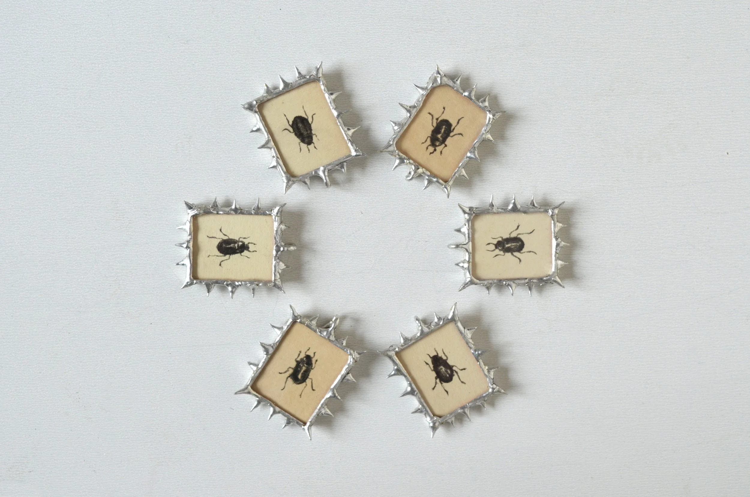 Spiked Relics — Laura Benson