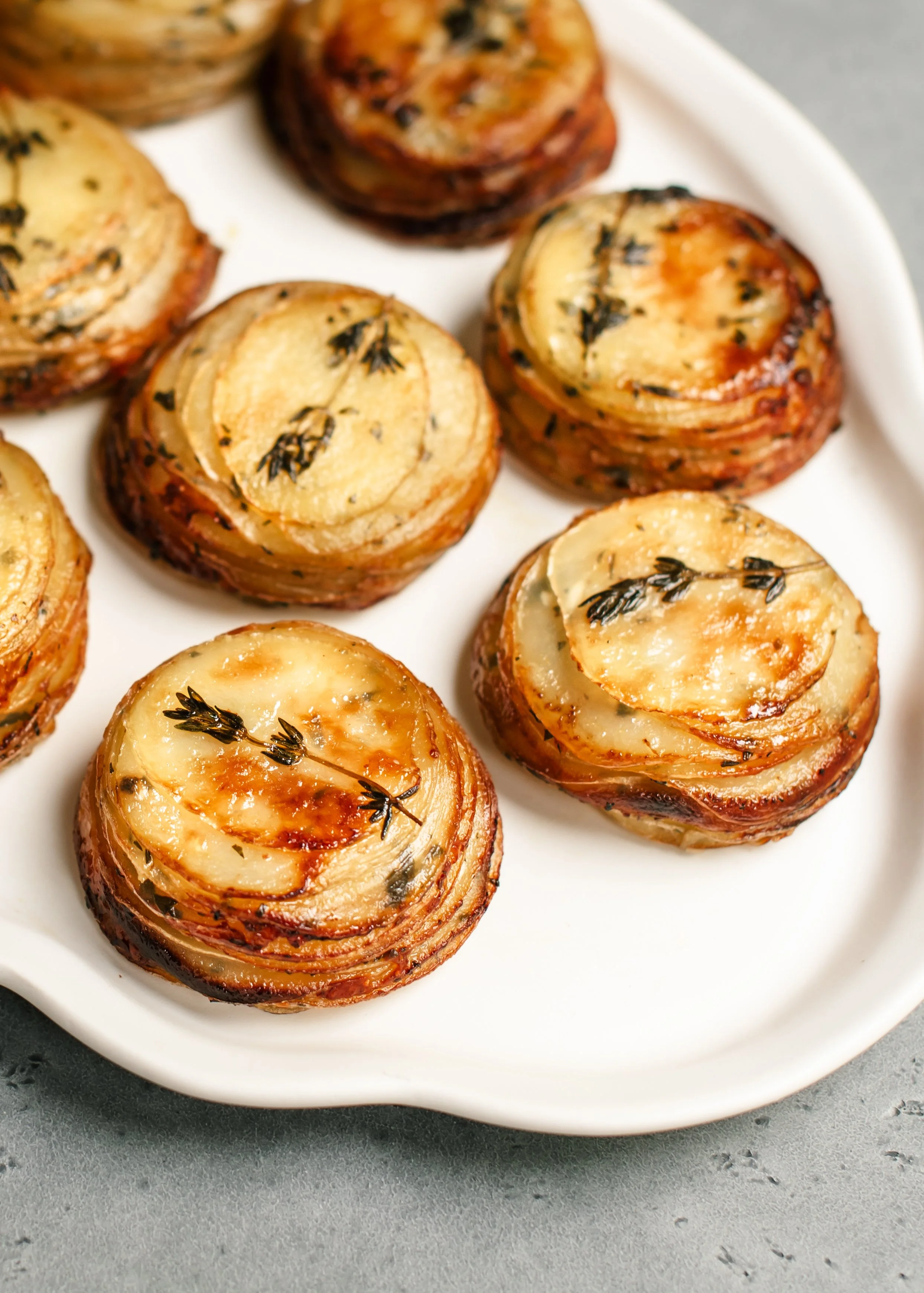 Crispy Potato Stacks with Garlic Herb Butter — saltnpepperhere
