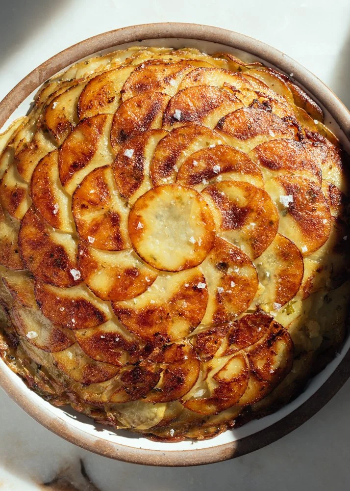 Pommes Anna with Garlic Herb Butter — saltnpepperhere