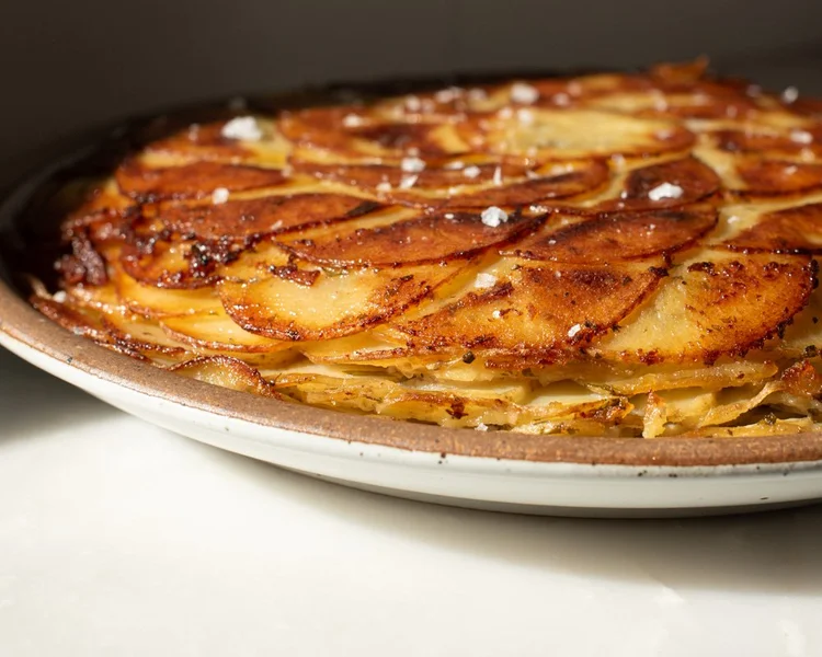 Pommes Anna with Garlic Herb Butter — saltnpepperhere