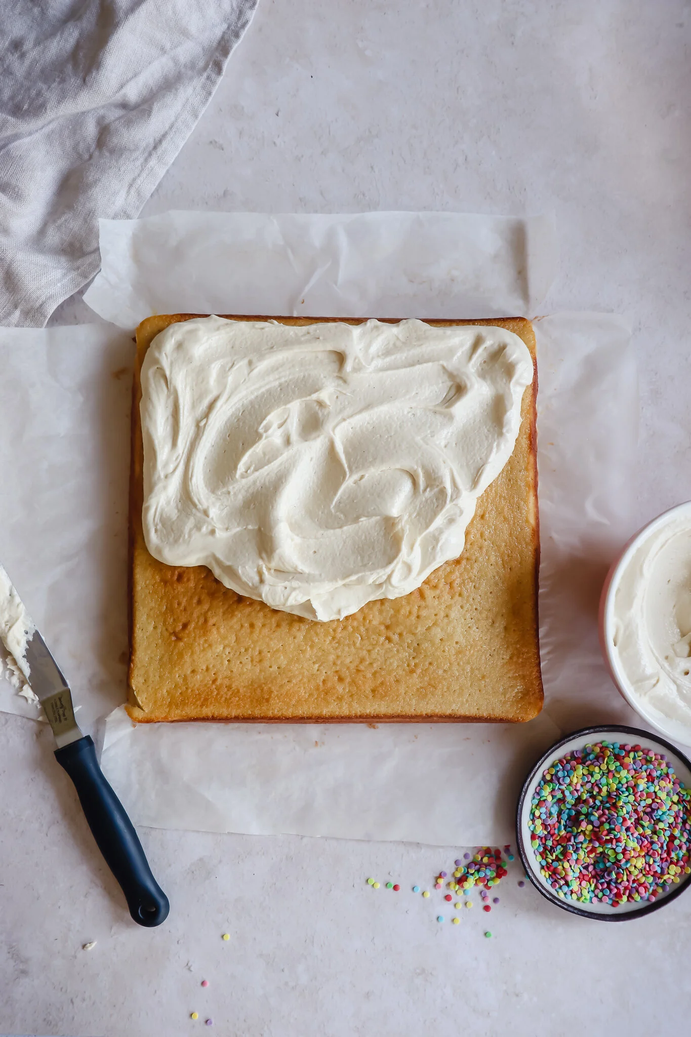 Sprinkle sponge cake with whipped vanilla buttercream — MARTHA COLLISON