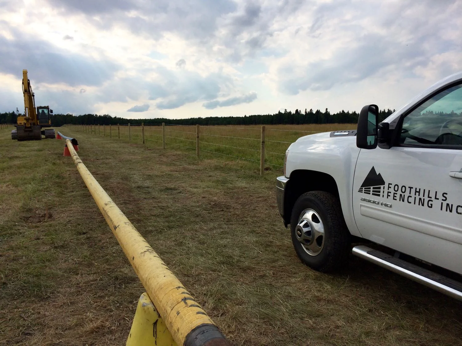 Oil & Gas pipeline fence — Foothills Fencing Inc