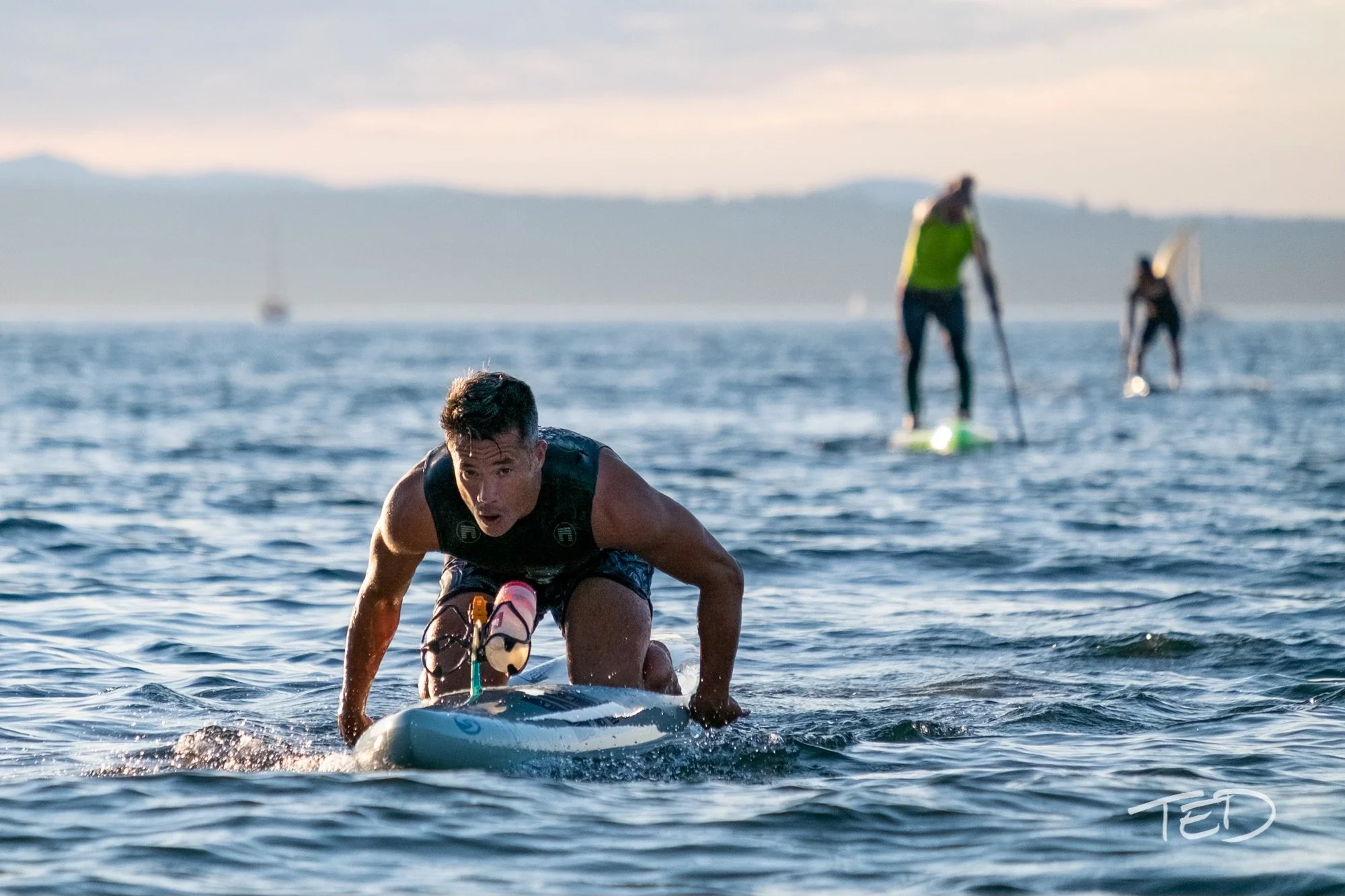 Prone paddle boarding — Arrow Physical Therapy Seattle
