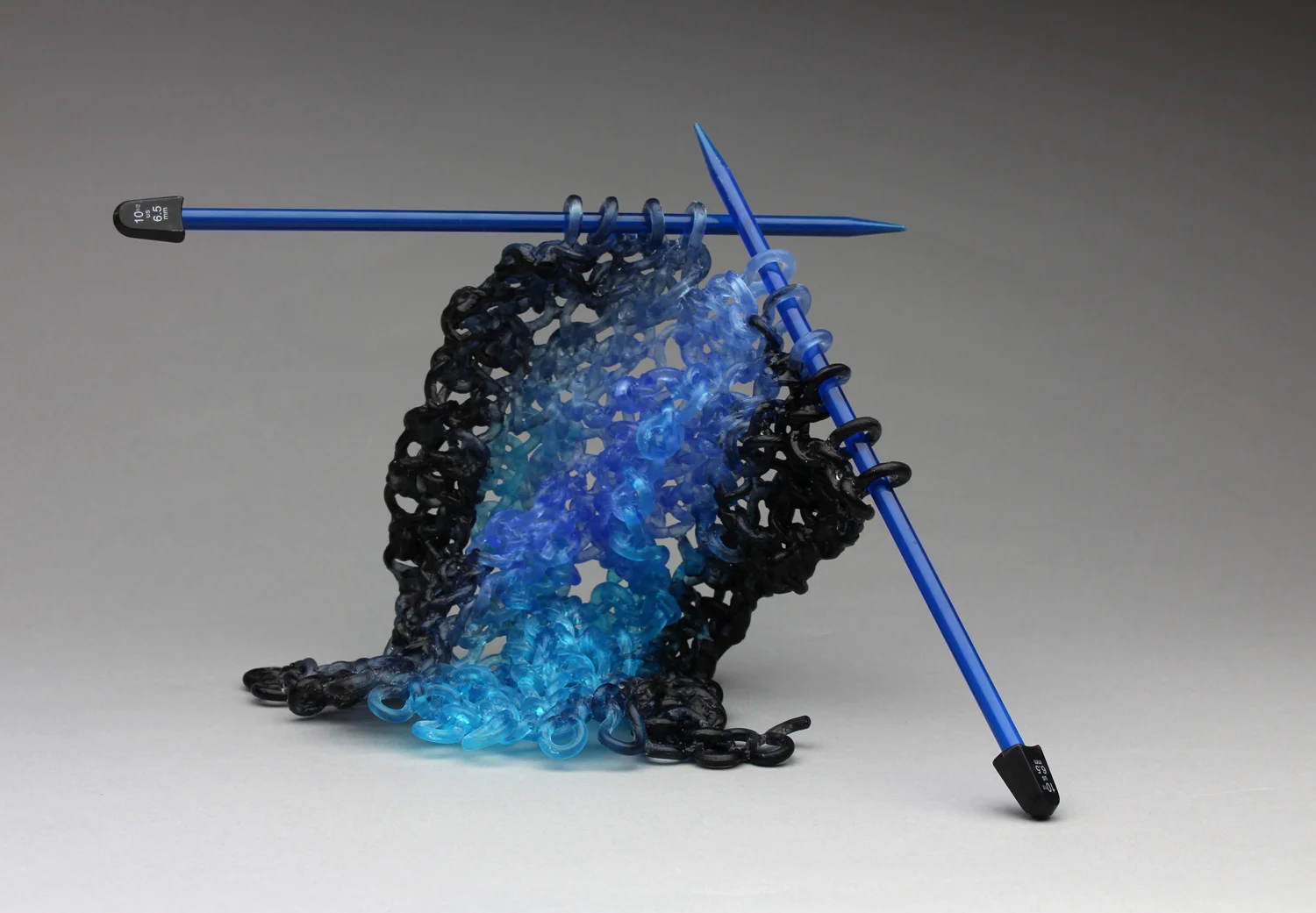 Carol Milne — Knitted glass sculpture with knitting needles