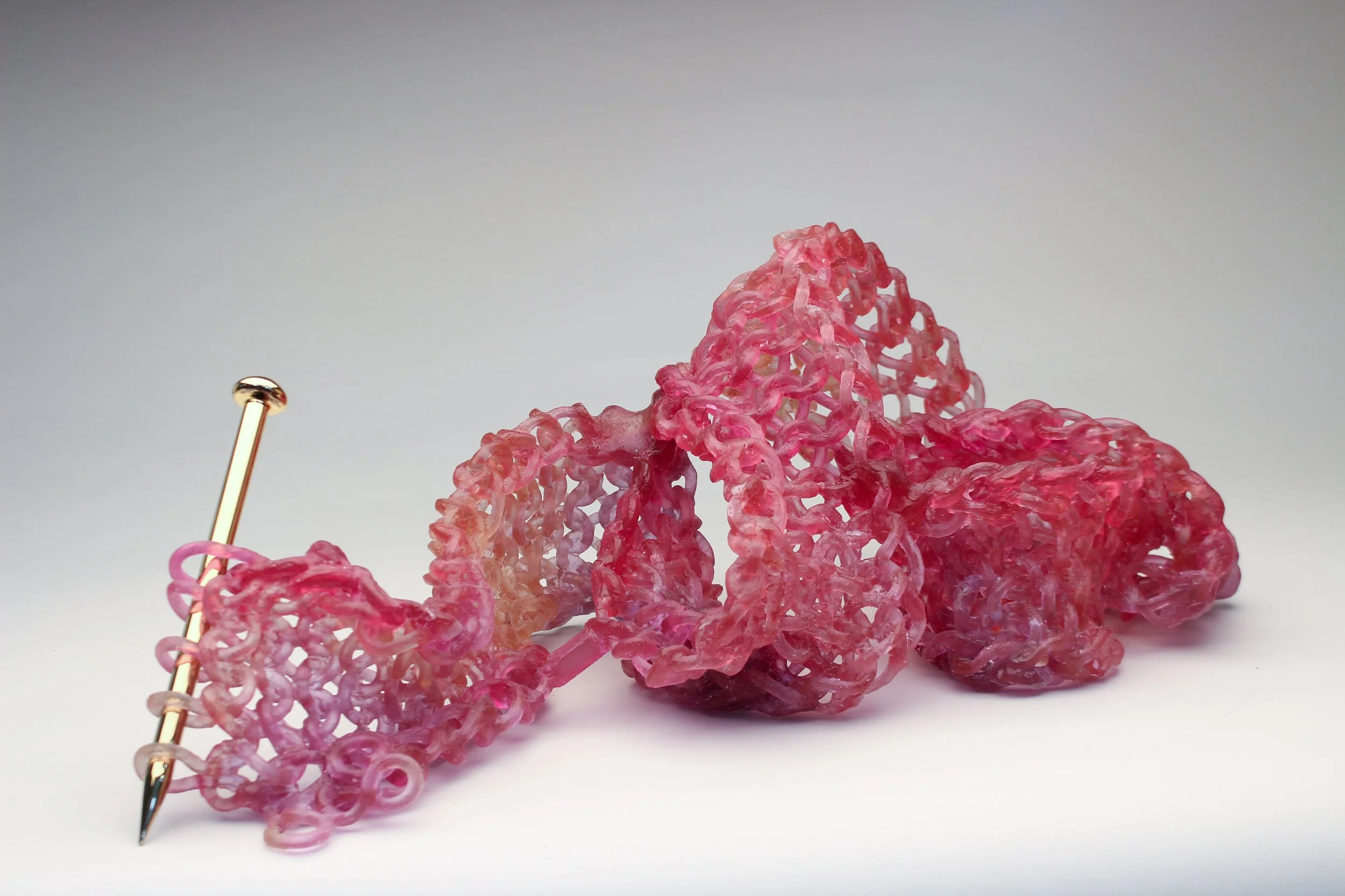 Carol Milne — Knitted glass sculpture with knitting needles