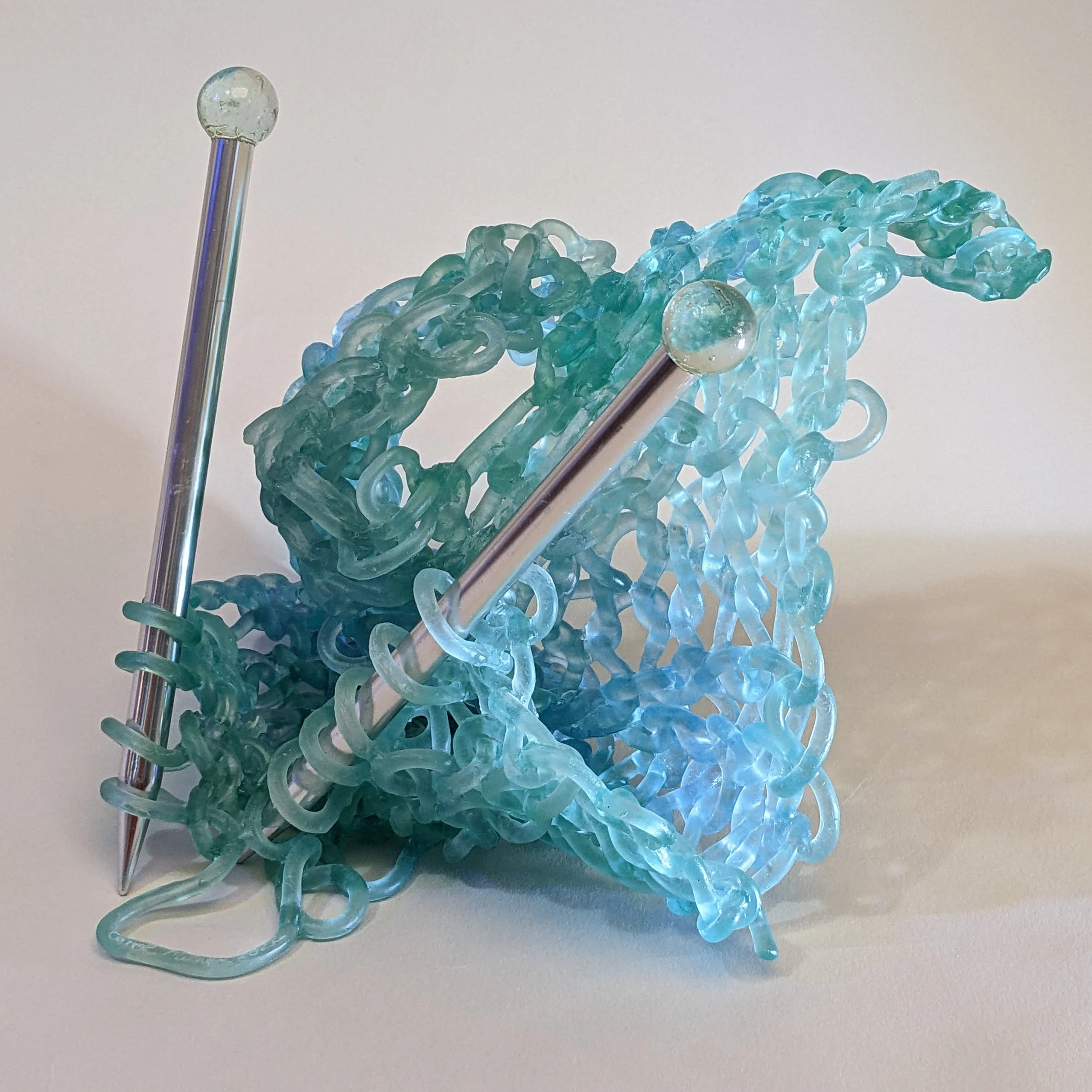 Carol Milne — Knitted glass sculpture with knitting needles