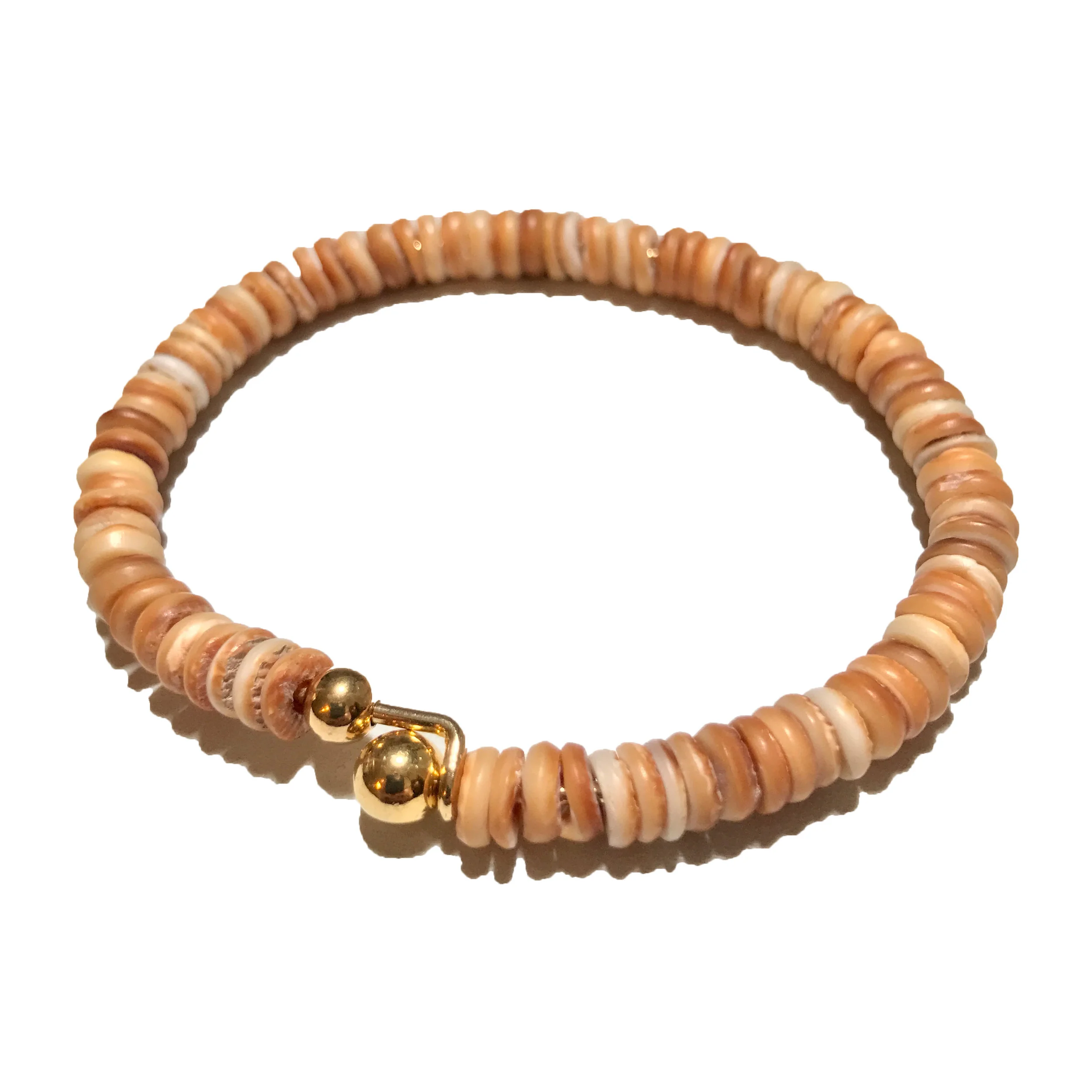 SHOP NOW — Golden Cowrie