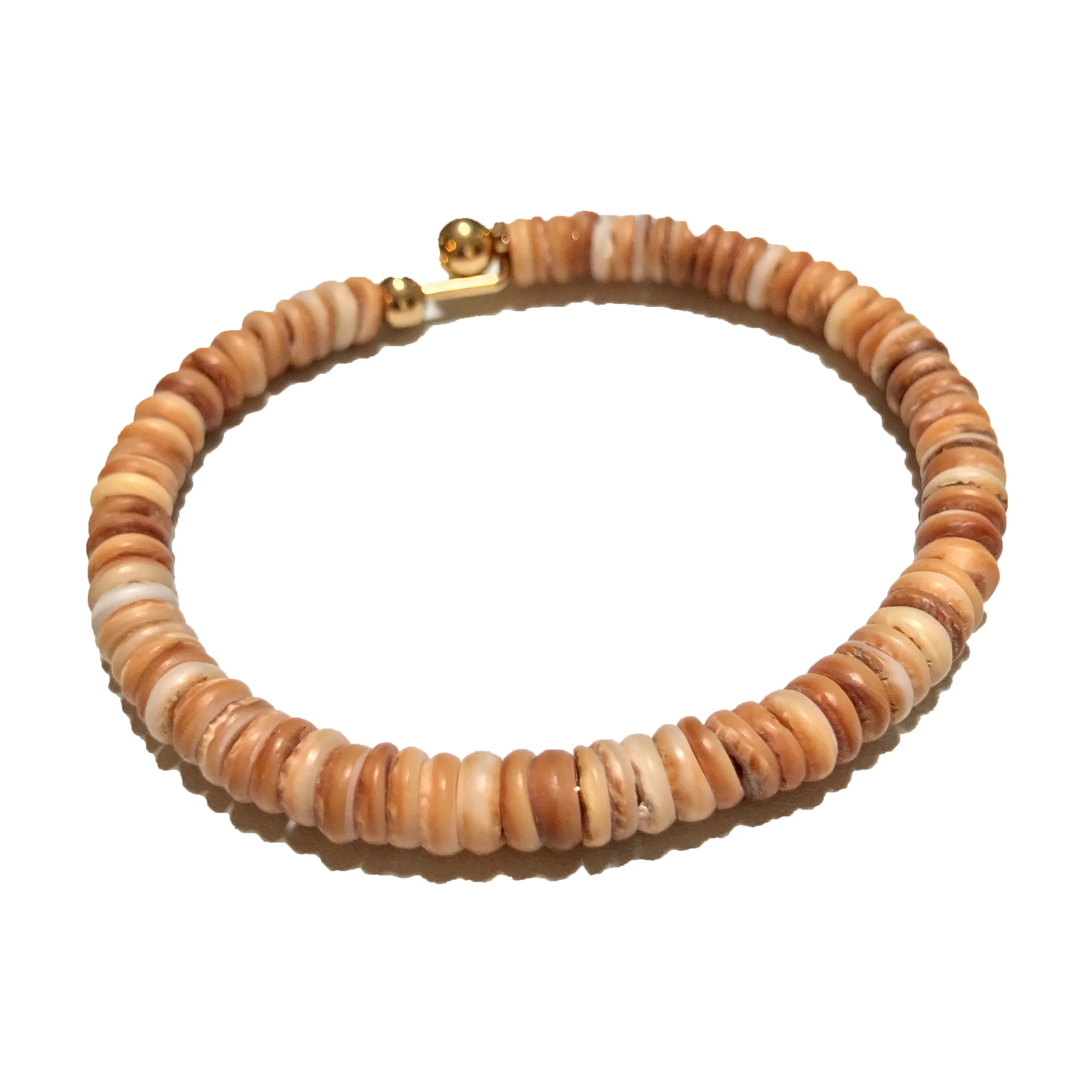 SHOP NOW — Golden Cowrie