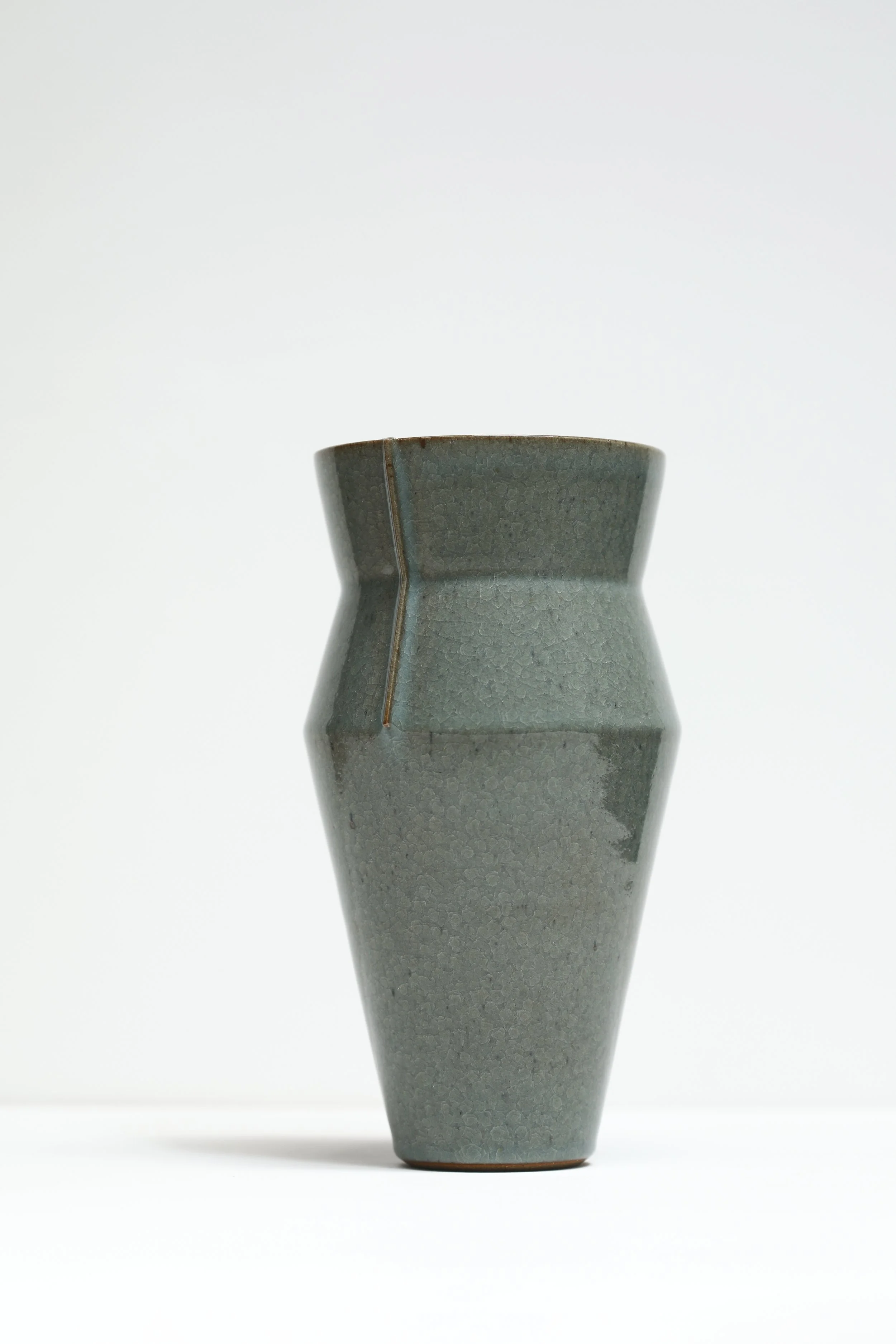 Tall lined angular vase, dark green feldspathic crackle glaze with ...