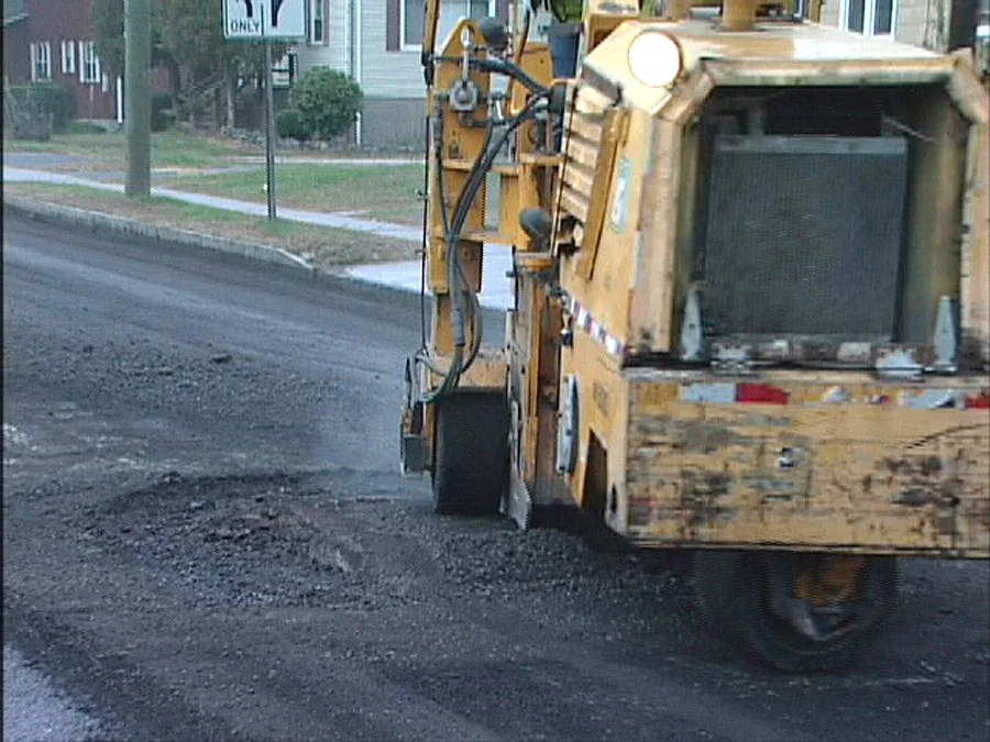 Trimming Utility Structures — Garrity Asphalt Reclaiming, Inc.