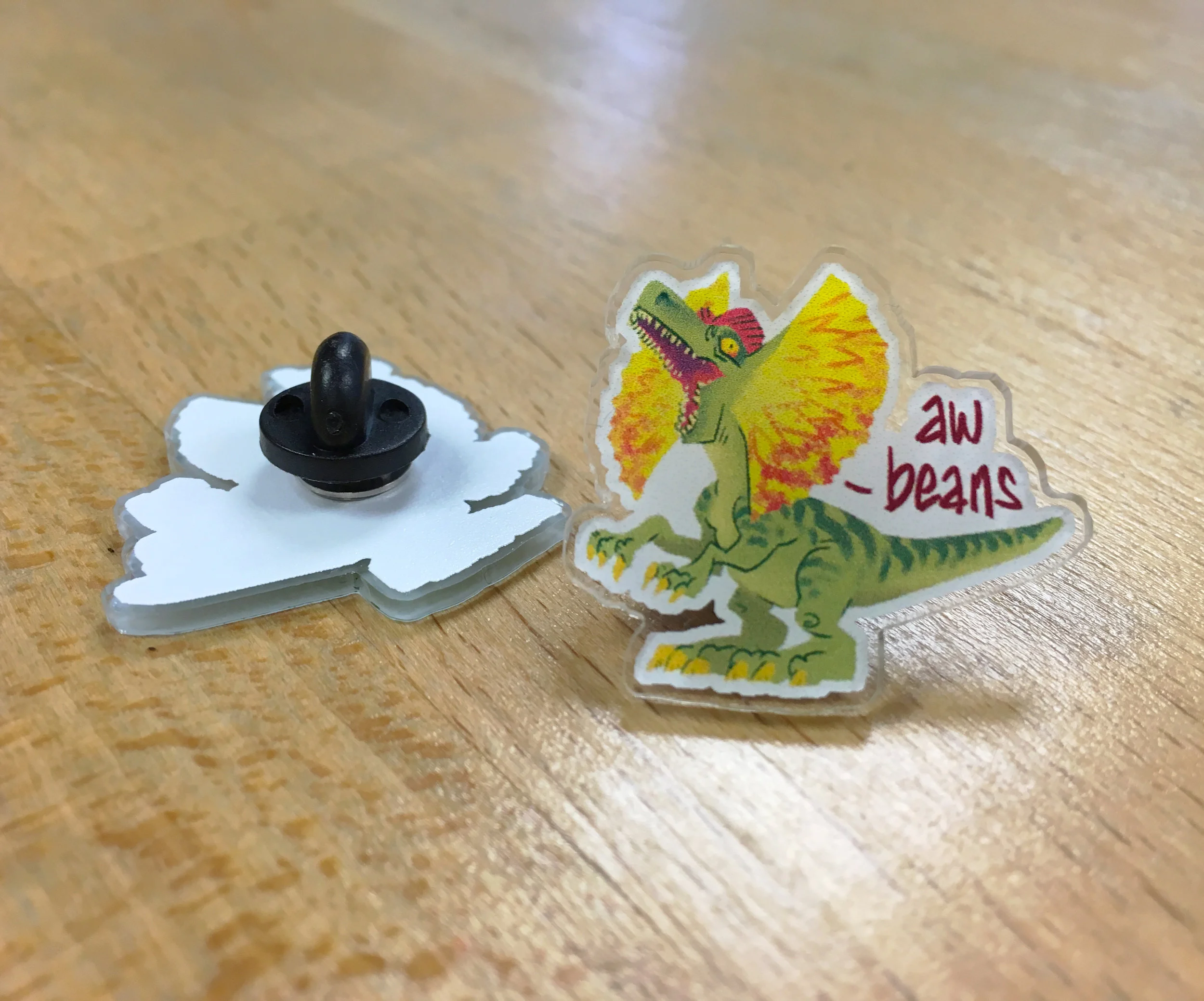 Dilophosaurus "Aw Beans" Pin — Ron Chan