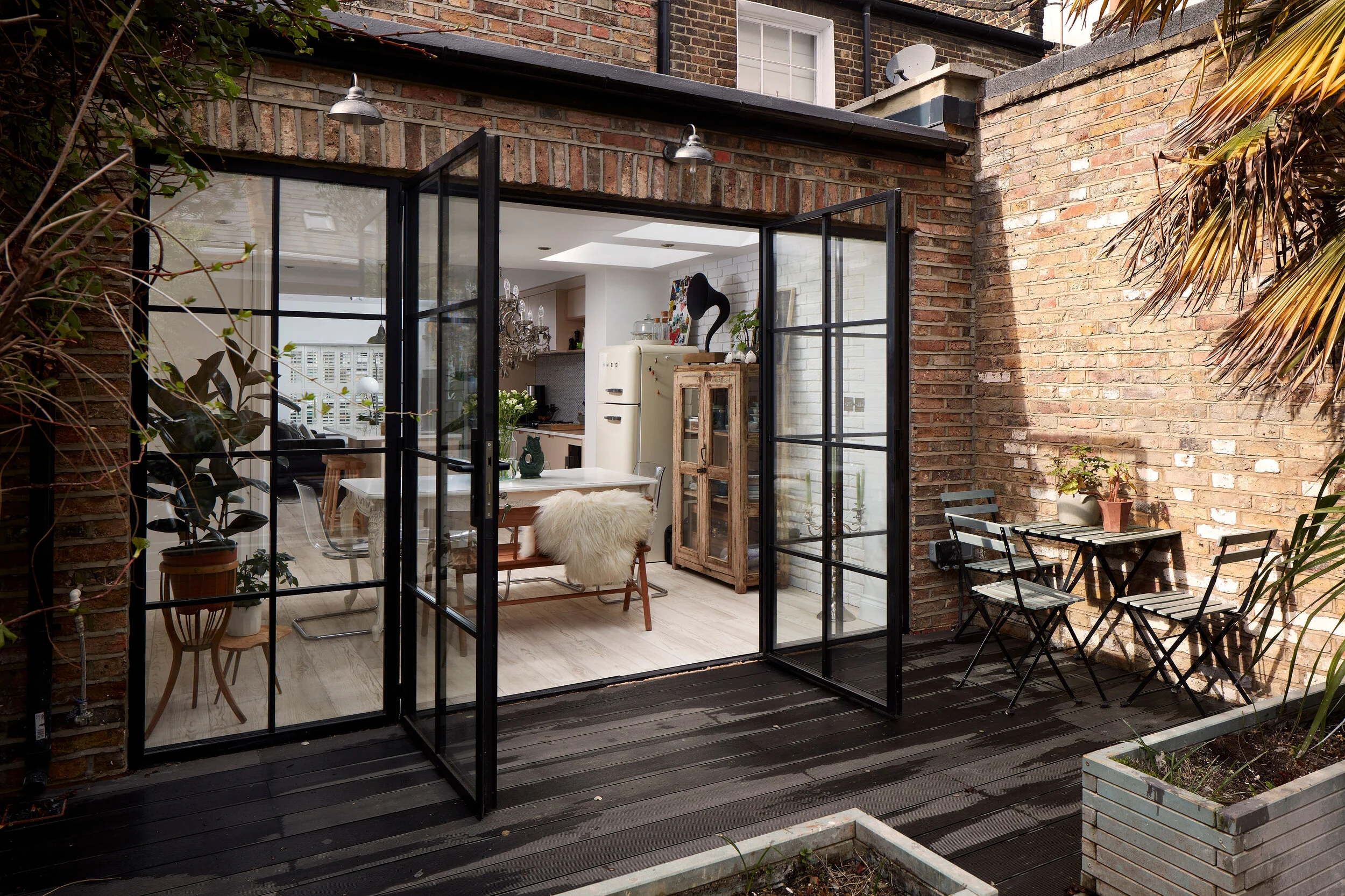 Check out this home extension with Crittall-style metal-framed windows ...