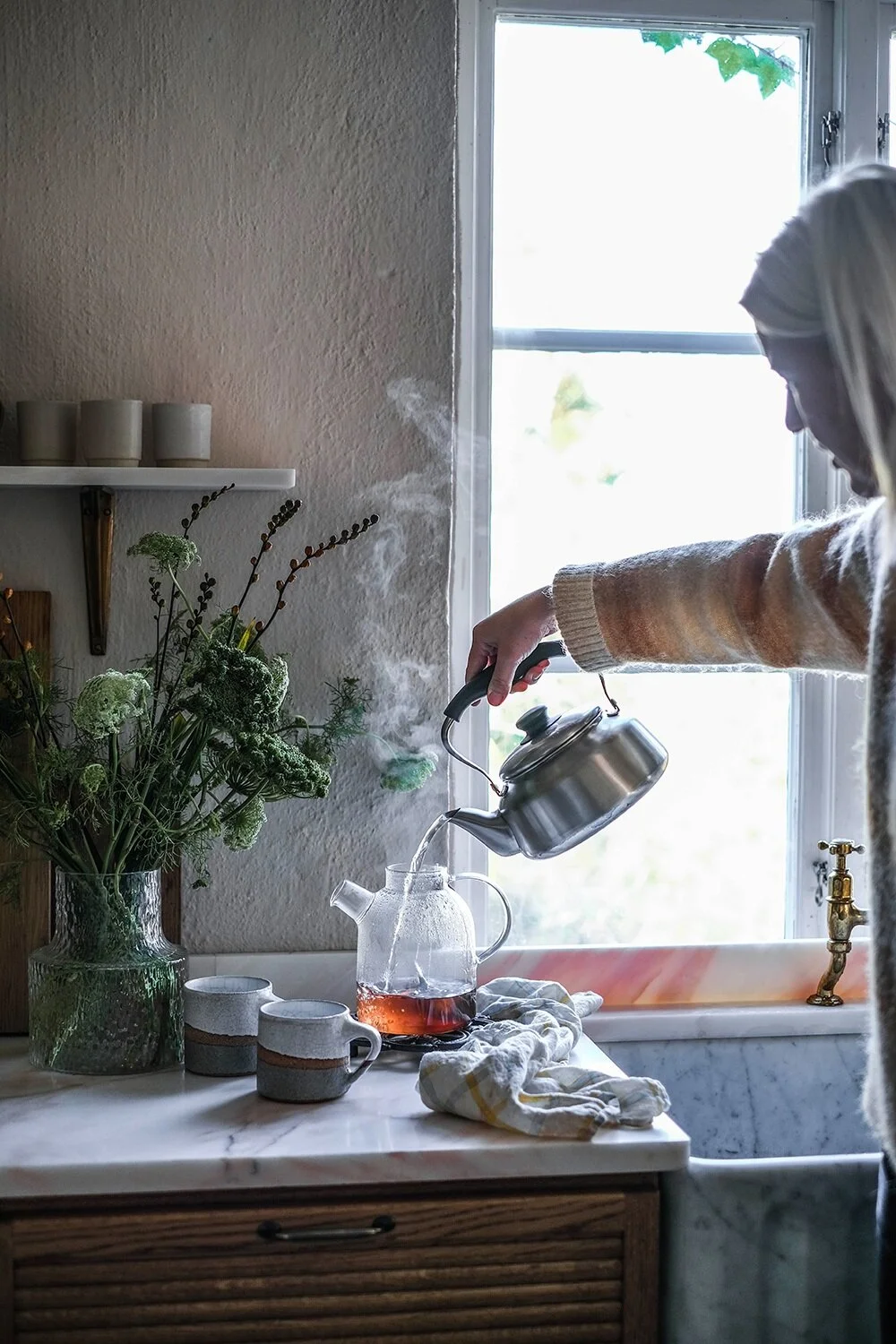 A Haberdashery style kitchen in Skåne, Sweden full of food-styling ...