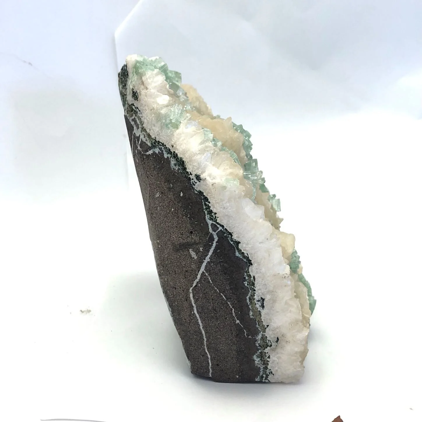 Heulandite (India) colored by Celadonite — The Jewel
