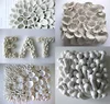 Polymer clay flower sculptures by Angela Schwer — DESIGNCOLLECTOR