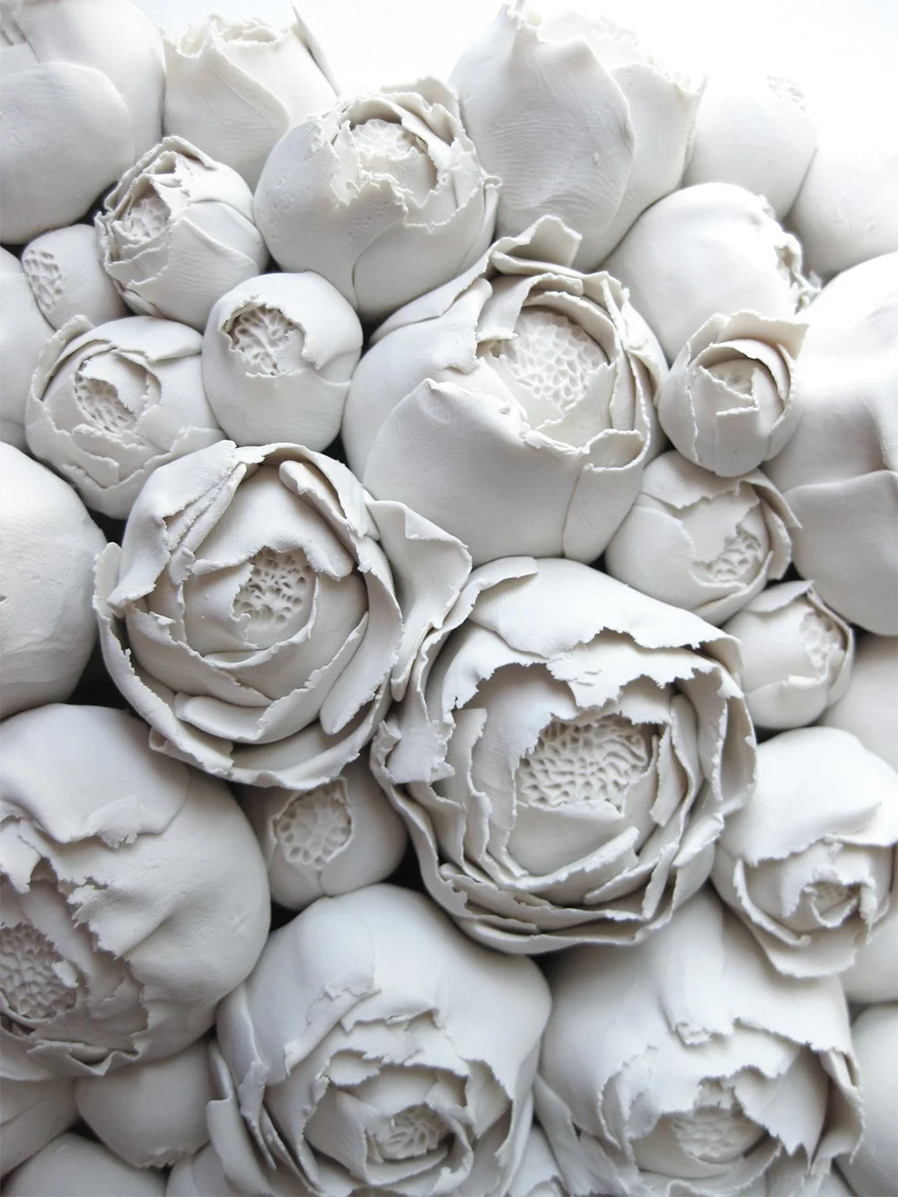 Polymer clay flower sculptures by Angela Schwer — DESIGNCOLLECTOR