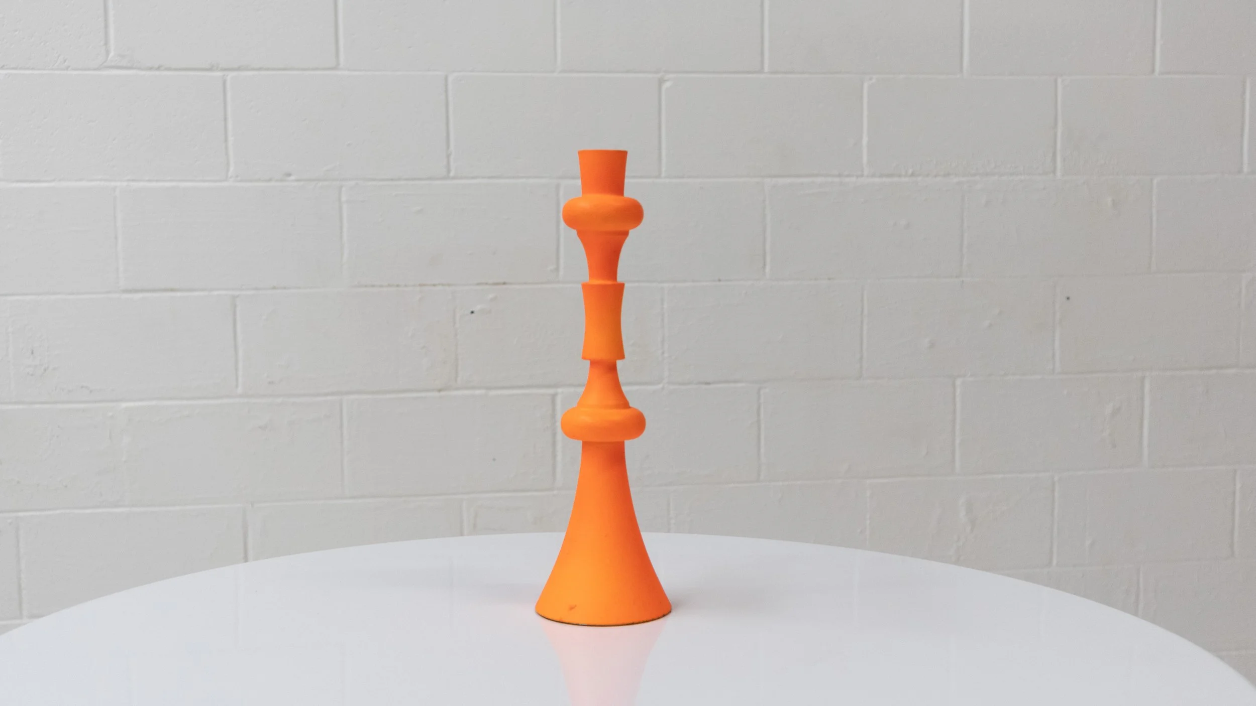 fluro-orange-candle-stick-avideas-event-hire-furniture-hire-event