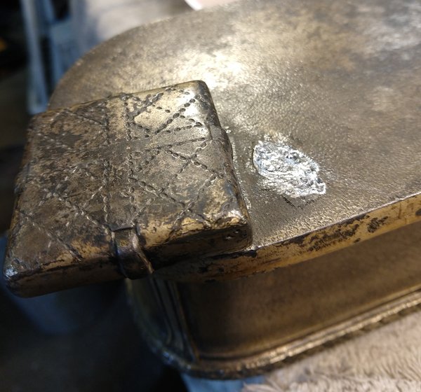 Repairing Athletic Figure Trophies — Harriete Estel Berman