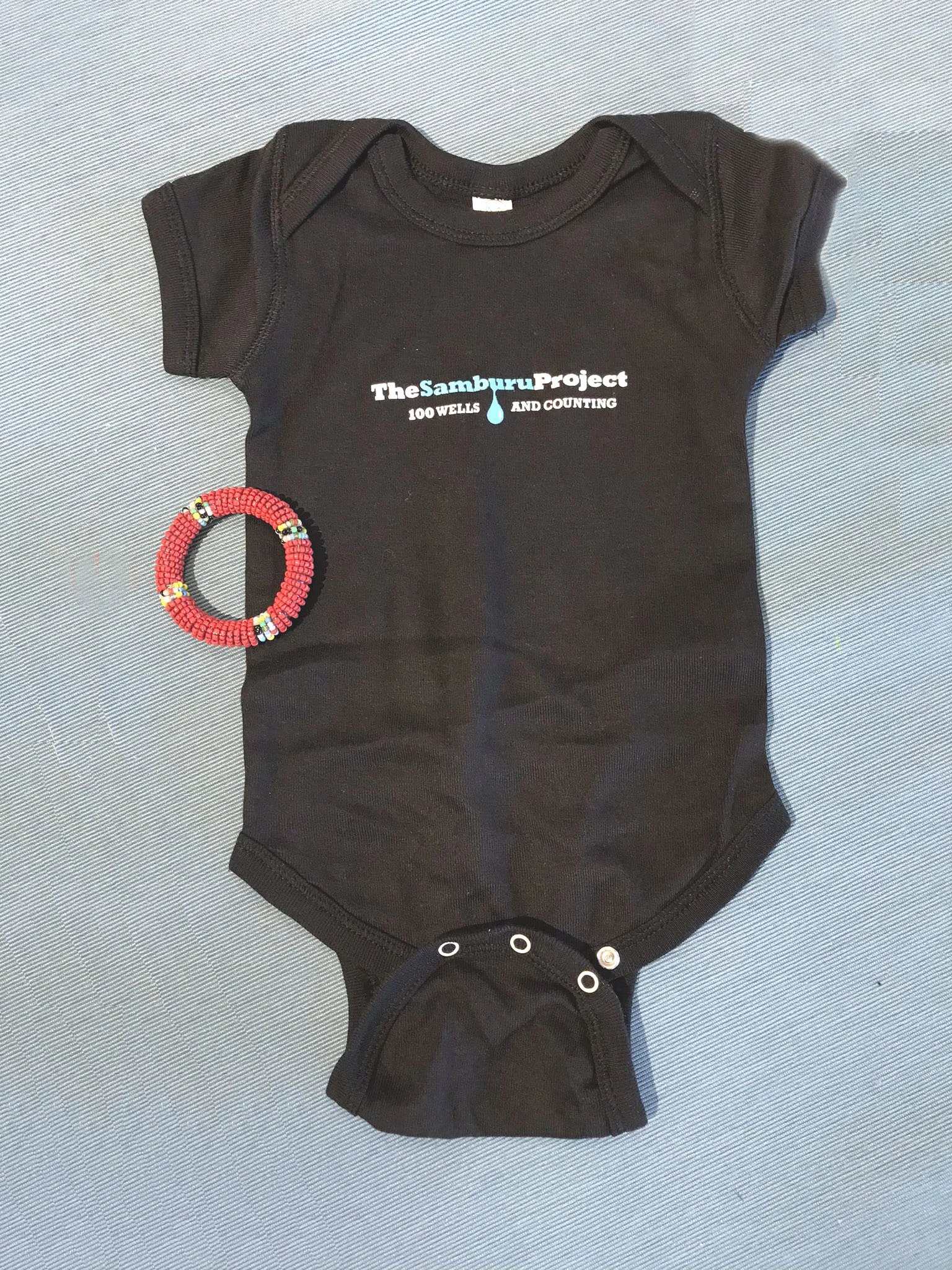 The Samburu Project — TSP Baby Onesie