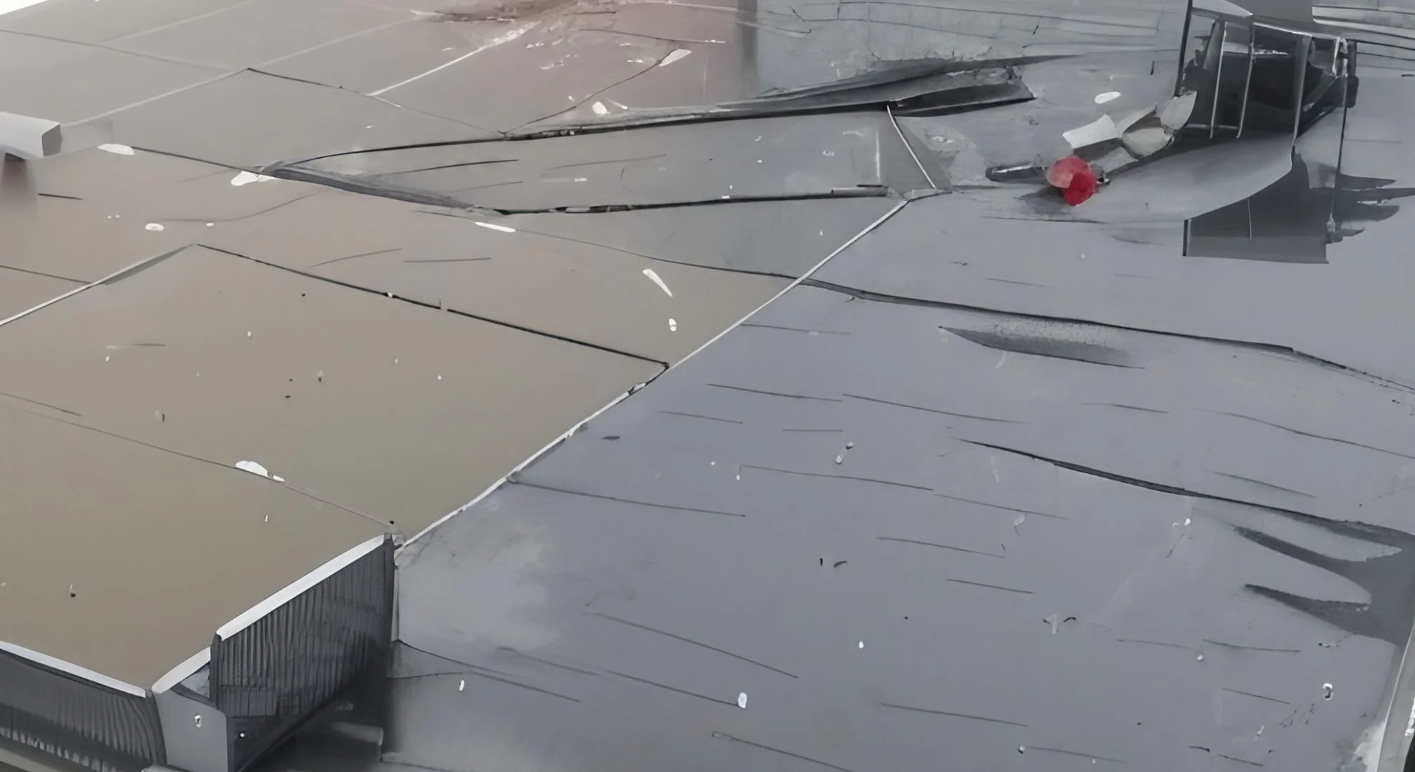 5 Signs of Storm Damage to Your Commercial Roof — Signature Exteriors ...