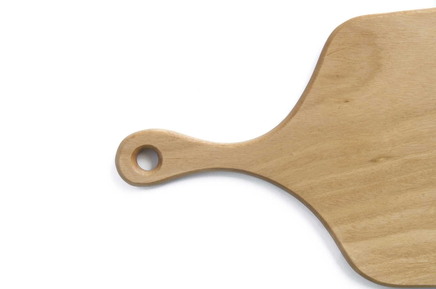 Handcrafted timber kitchen serving, cheese, bread and chopping boards ...