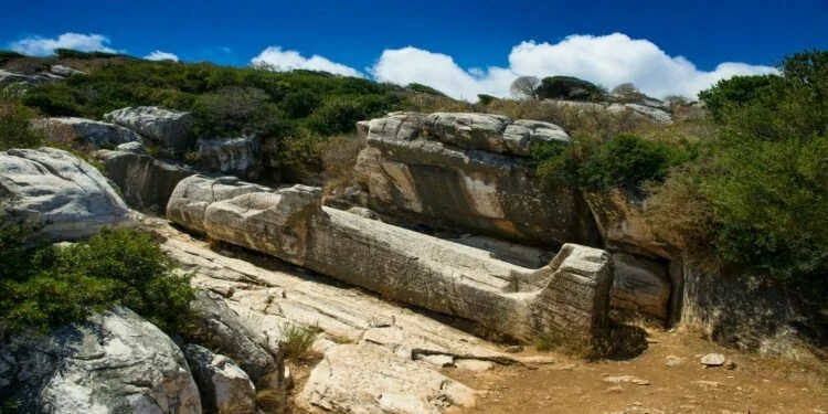 The ancient Greek statue, laying on the ground for centuries