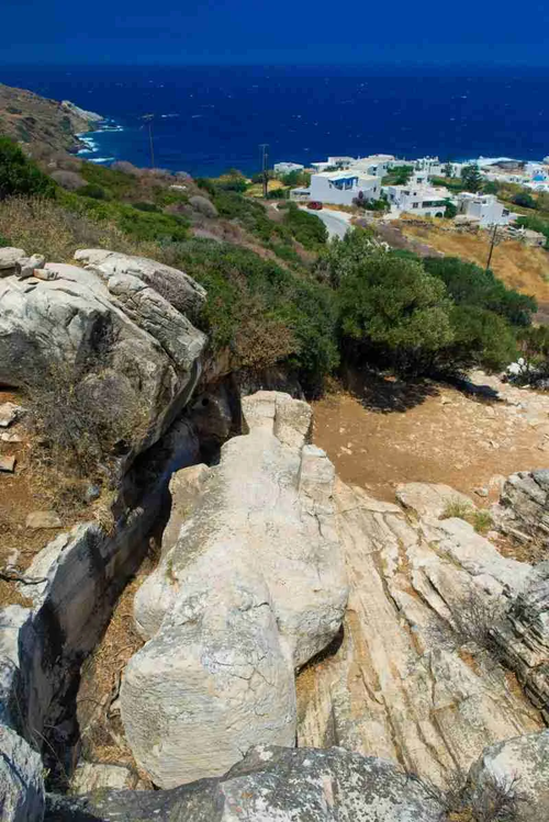 The Apollo Kouros: A Colossal Ancient Statue Resting on a Hillside in ...