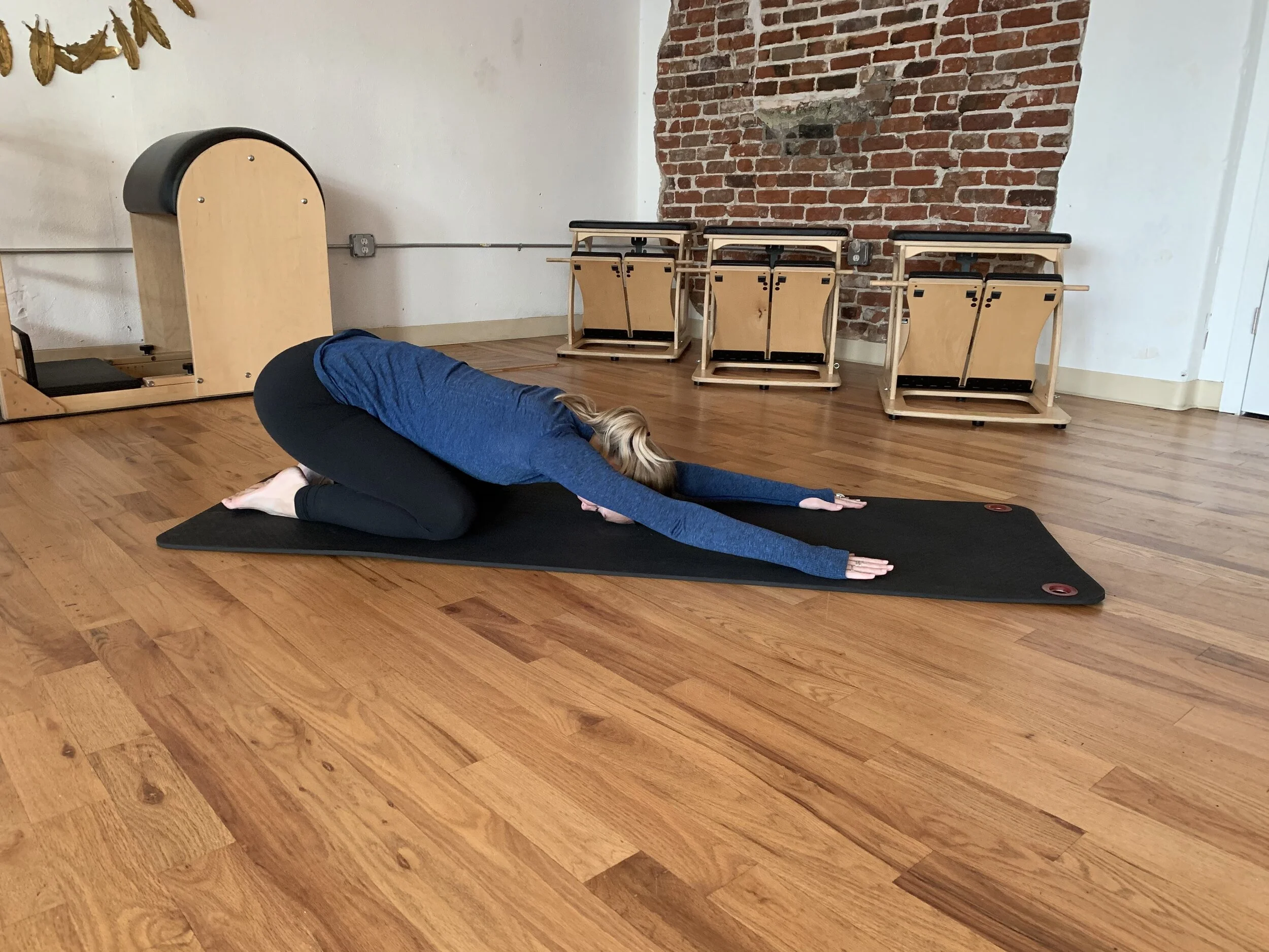 4 Relaxing Stretches to do at Home — Pilates Collective Denver