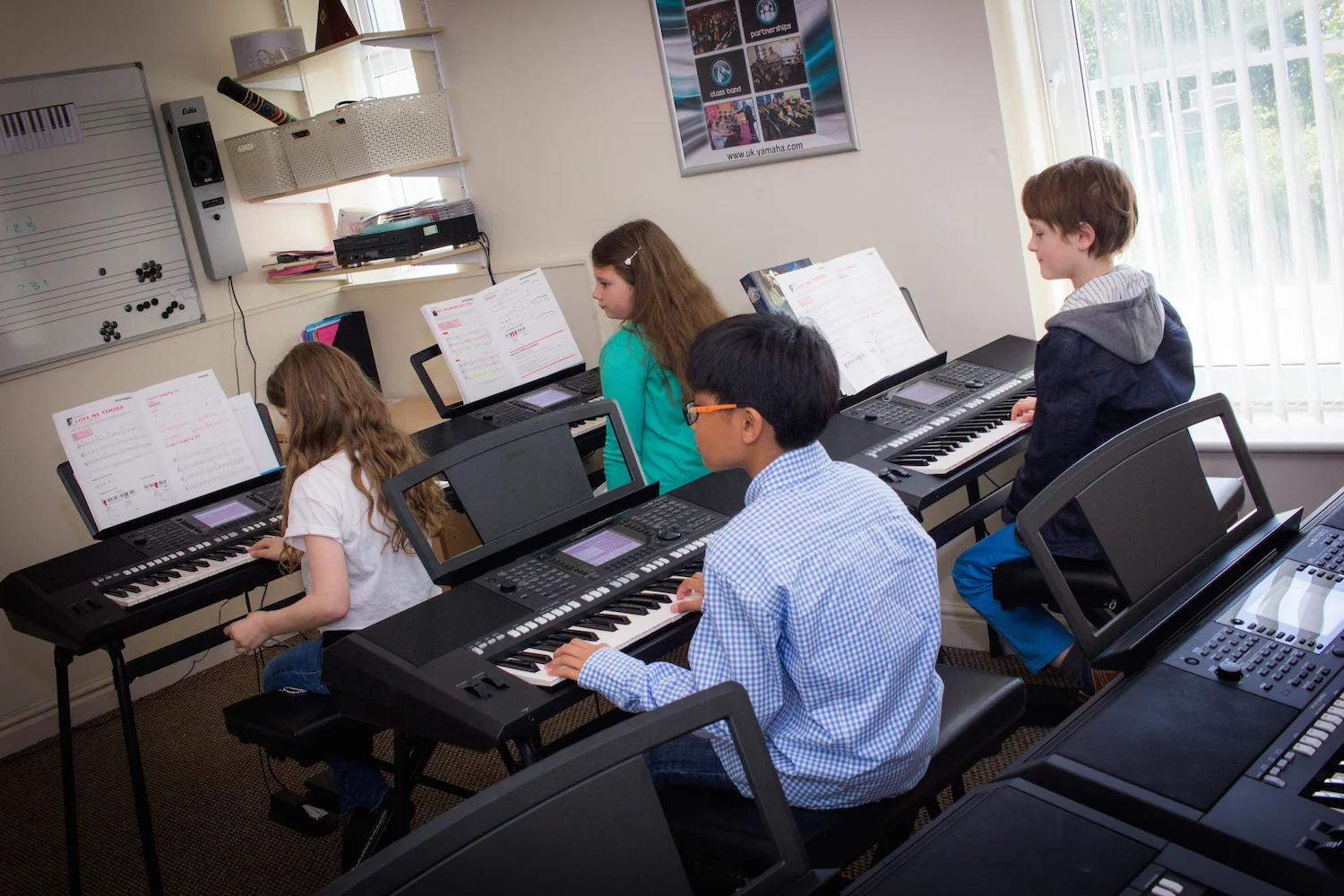 Stockport Music School - Guitar, Keyboard, Drums and Woodwind Lessons Home