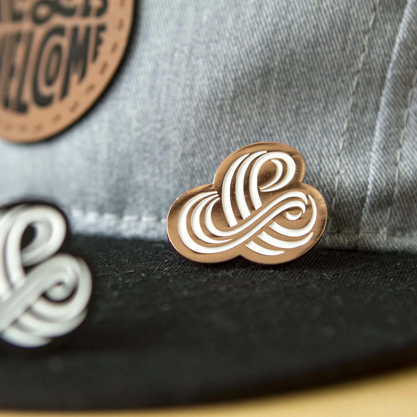 Tri-Line Ampersand Pin — PSTL