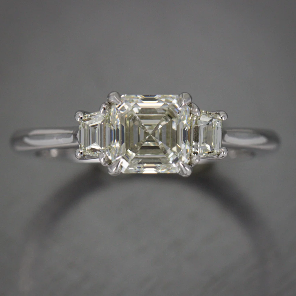 Emerald Cut Engagement Rings With Trapezoid Side Stones