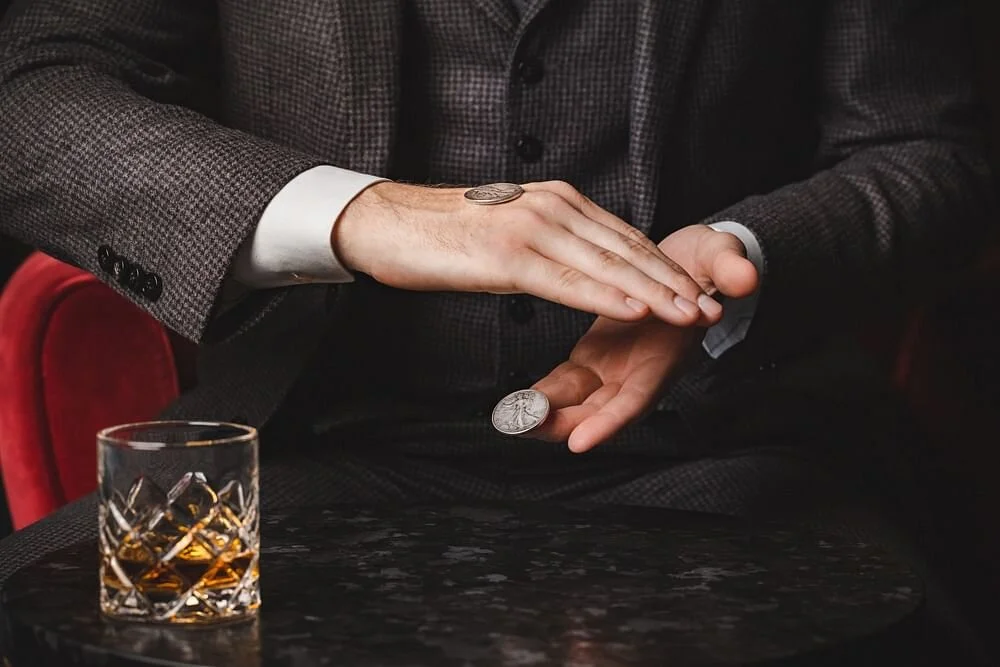 Coin Over Knuckles Trick