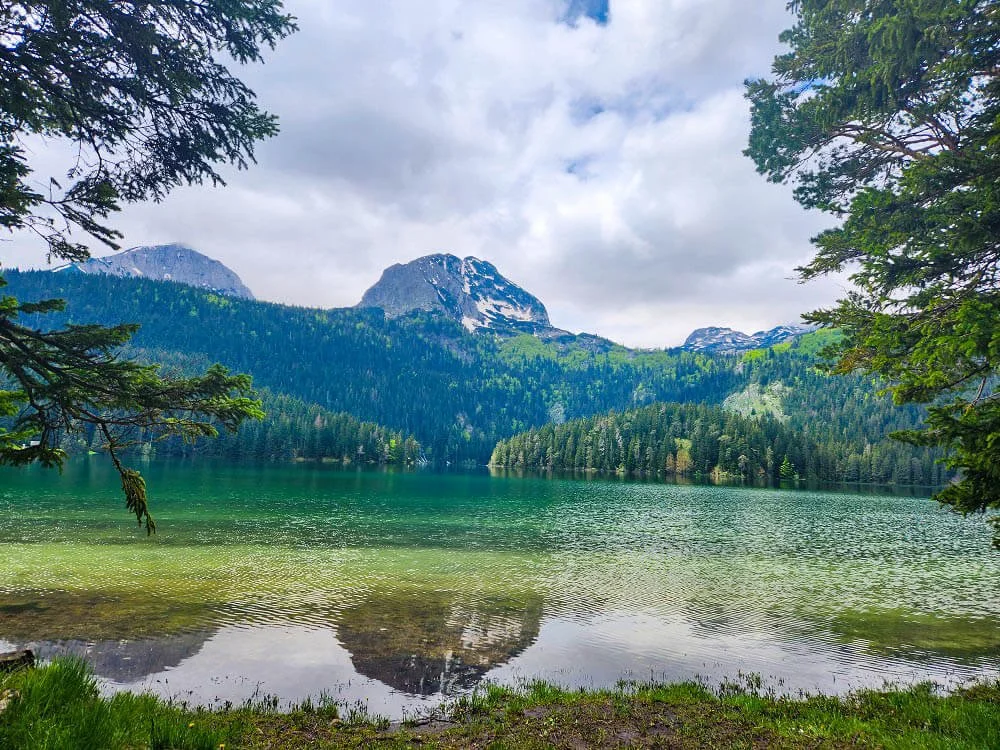 the black lake at durmitor national park. one of the easiest hike to ...