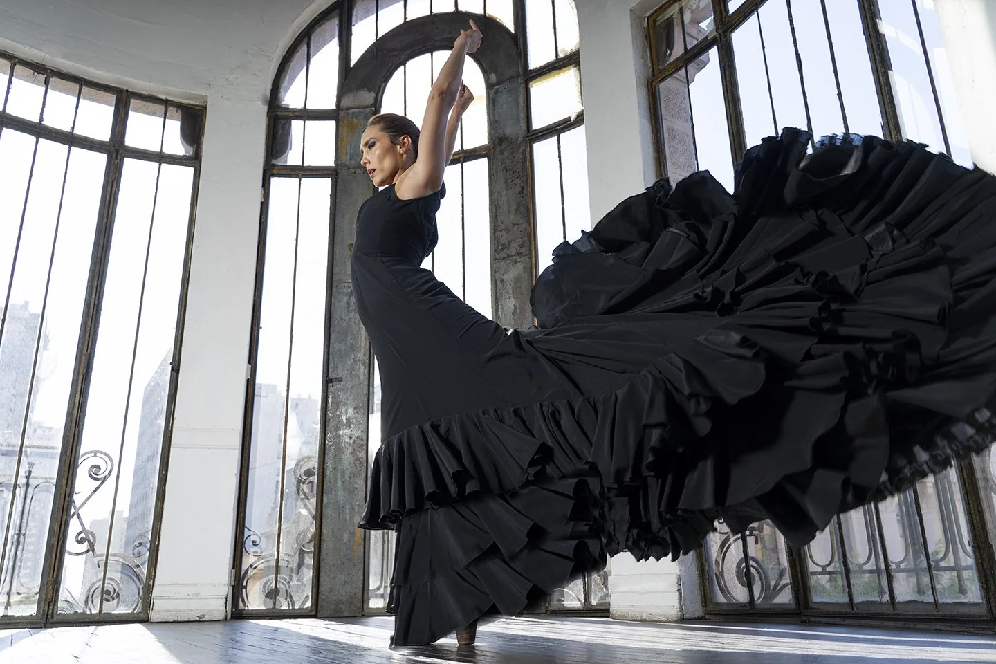 What is Bata de Cola? — National Institute of Flamenco