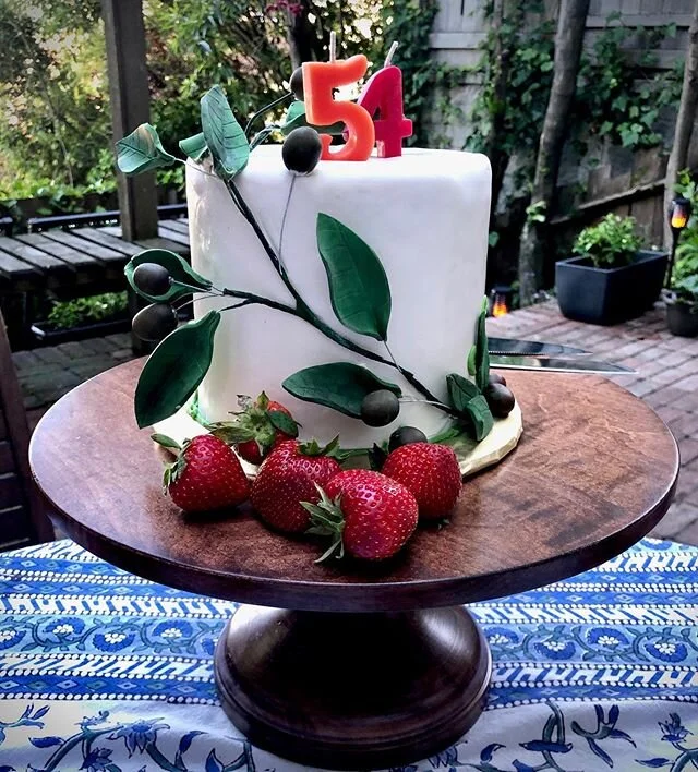 A Gold Ornament and White Lace Wedding Cake and a Tinga Tinga Art ...
