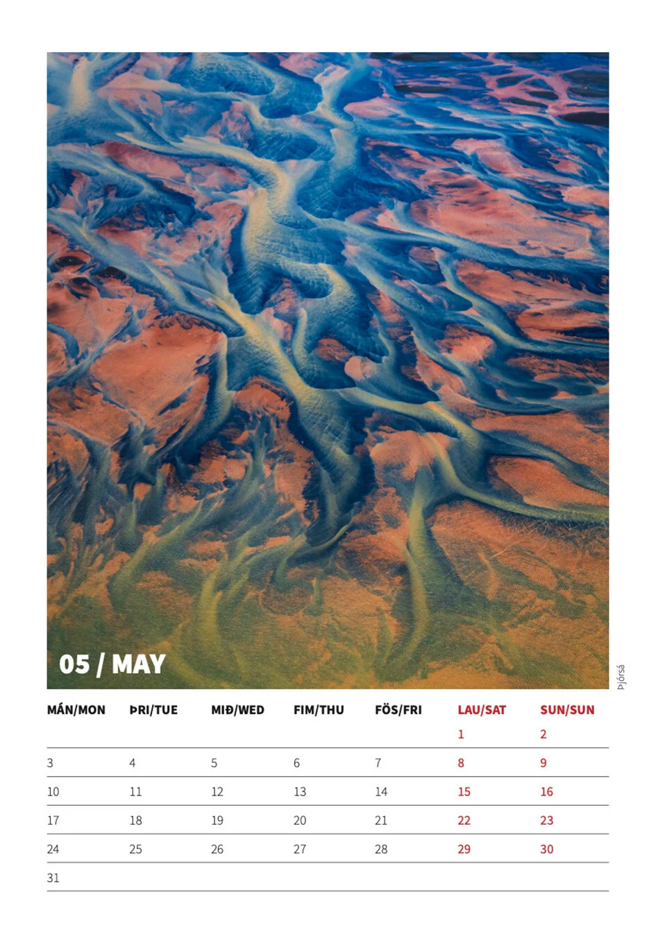 Sumarhúsið og garðurinn