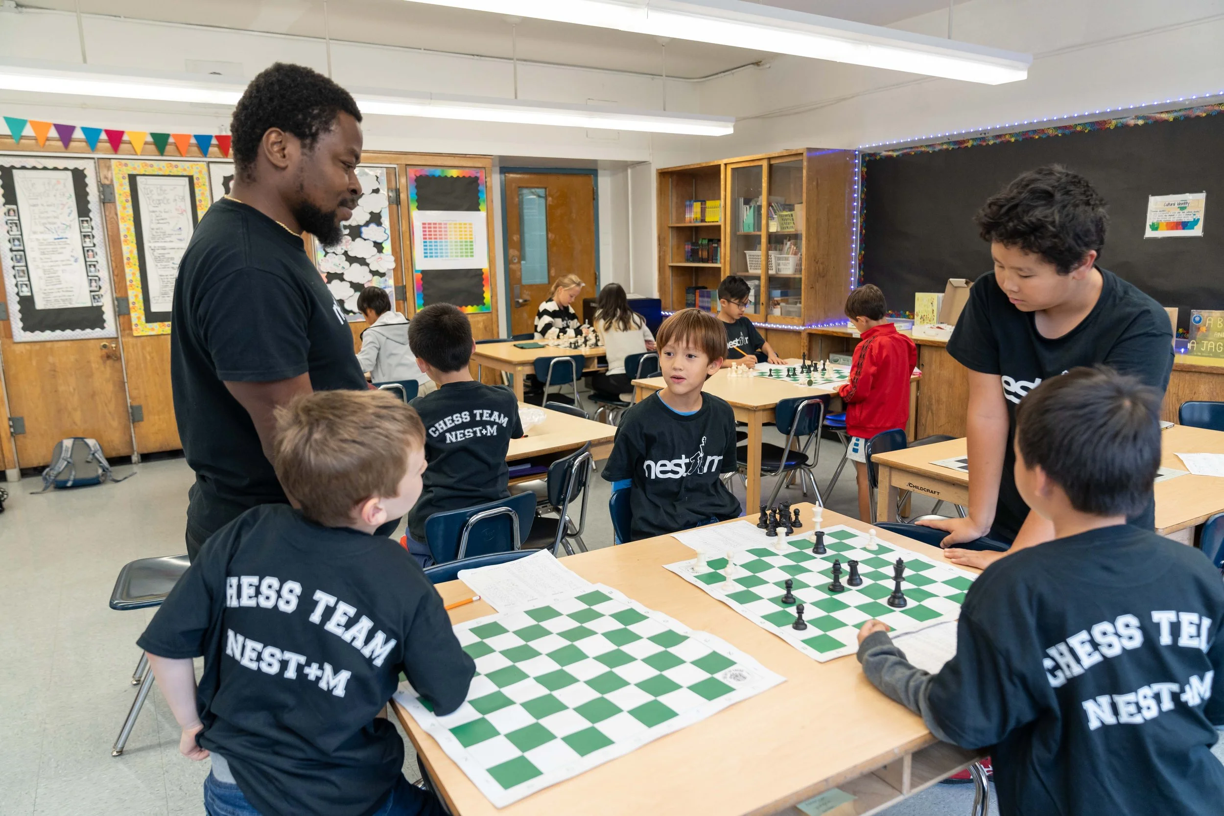 NEST+M Chess Club & Team — Impact Coaching Network