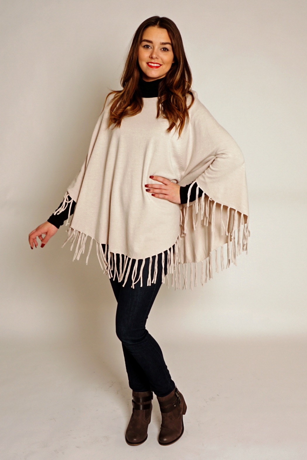 How to Wear a Poncho — The Sandbox in The City