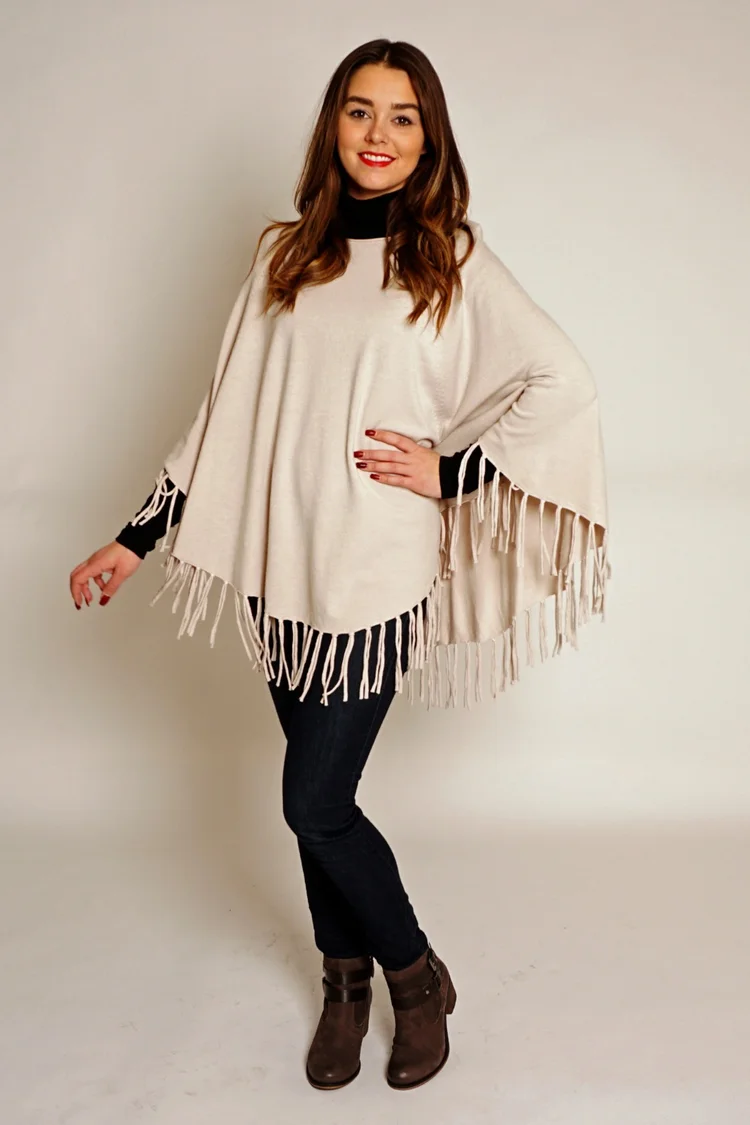 How to Wear a Poncho — The Sandbox in The City