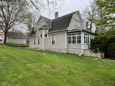 AAA Real Estate Auction — Olson Pearson Auctions & Realty