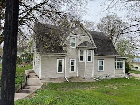 AAA Real Estate Auction — Olson Pearson Auctions & Realty
