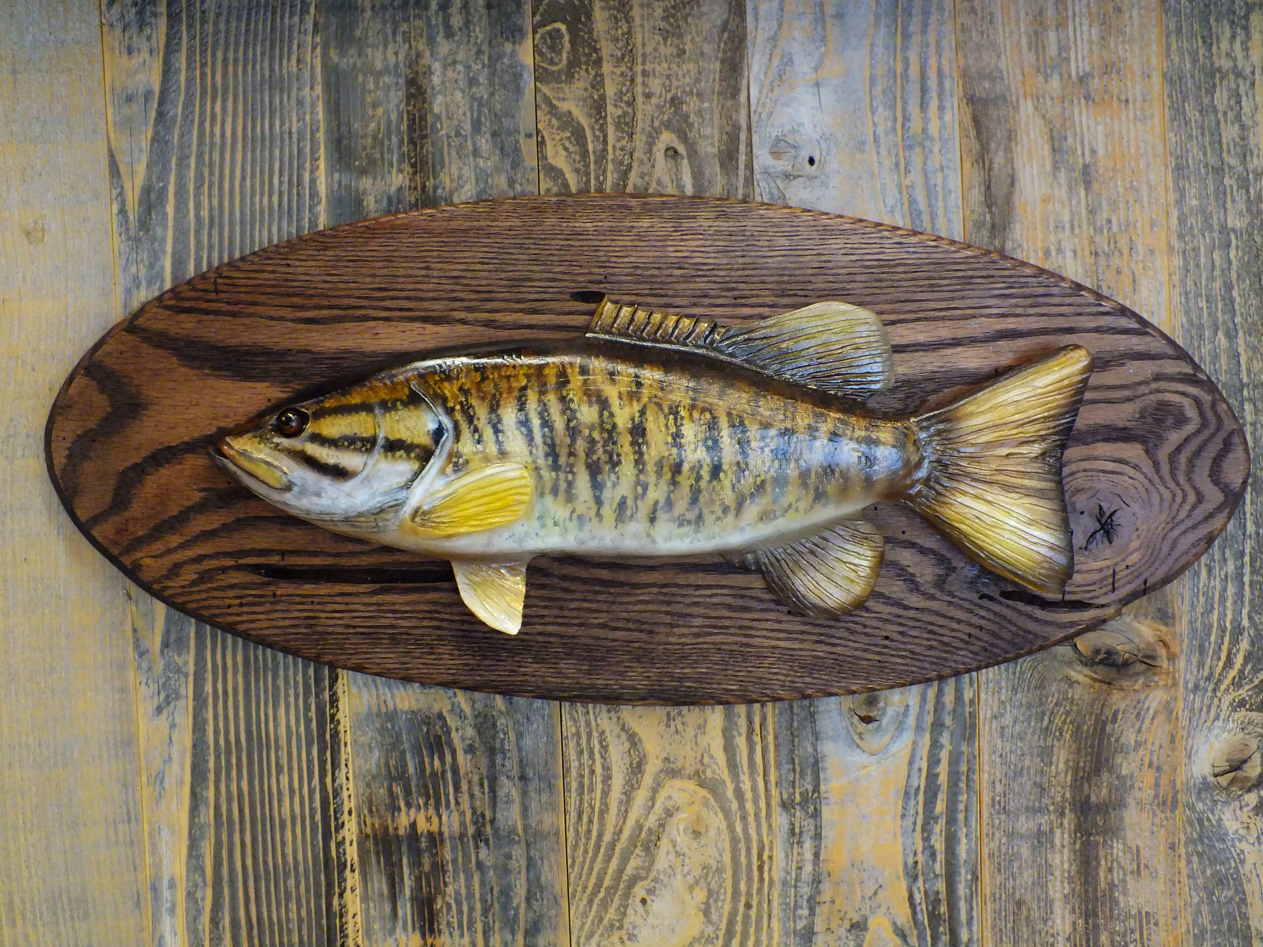 Carved Wooden Fish Sculptures