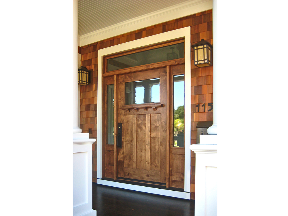 Oval Window Shingle Style Home