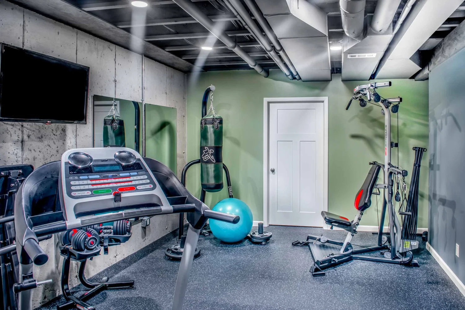 A Remodeled Finished Basement and Exercise Room — Degnan Design-Build ...