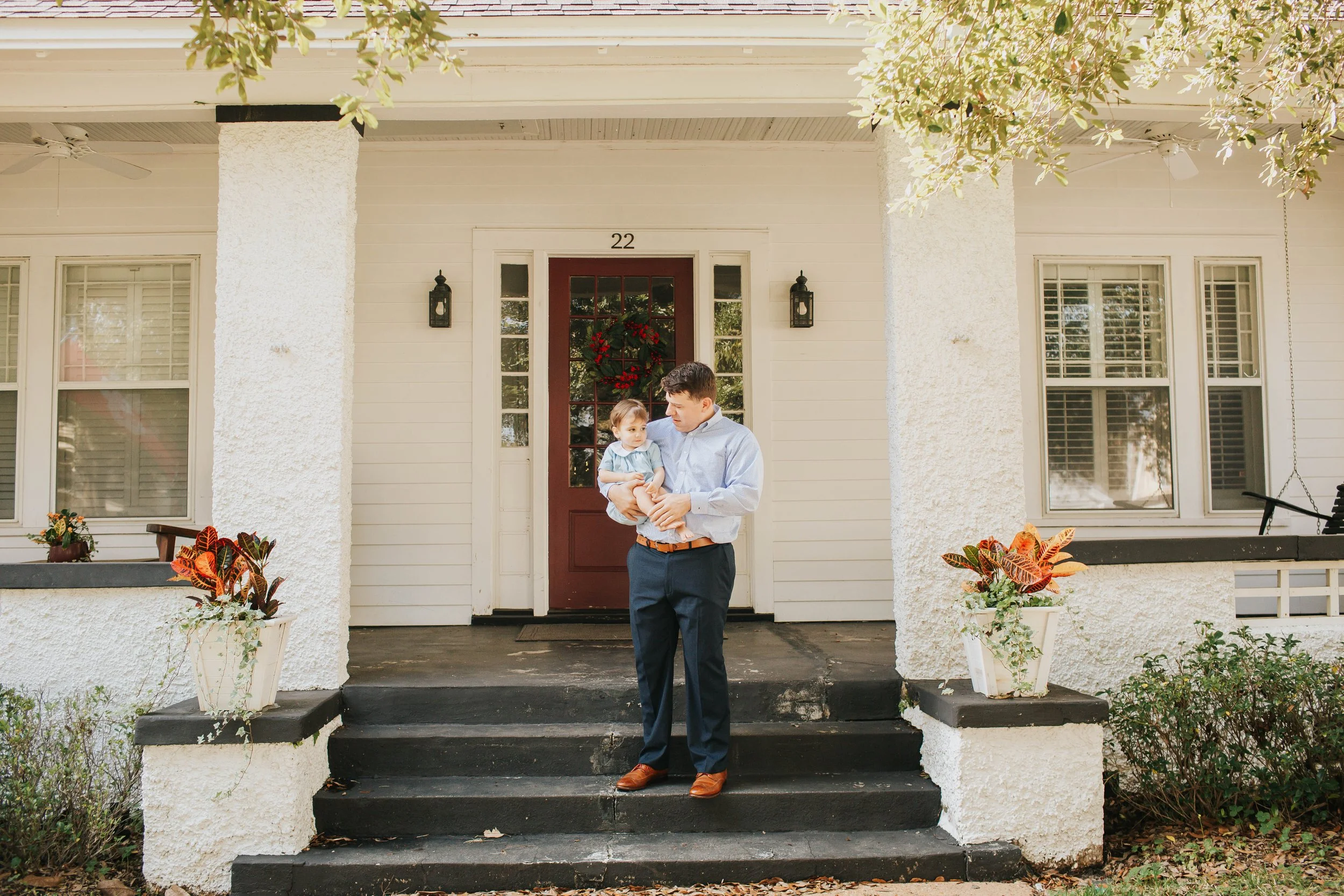 Rich Family In Front Of House